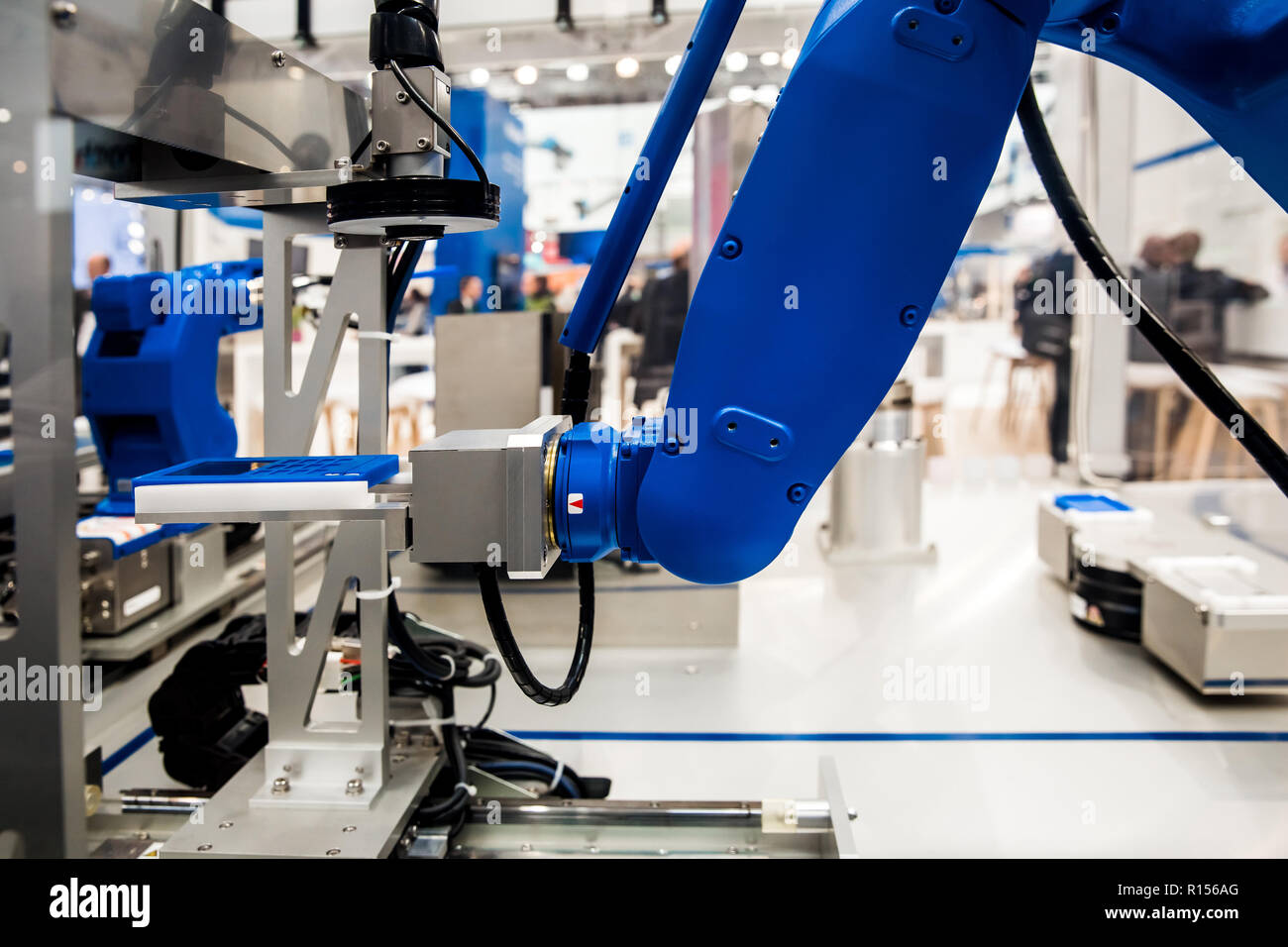 Robot arm in assembly line Stock Photo - Alamy