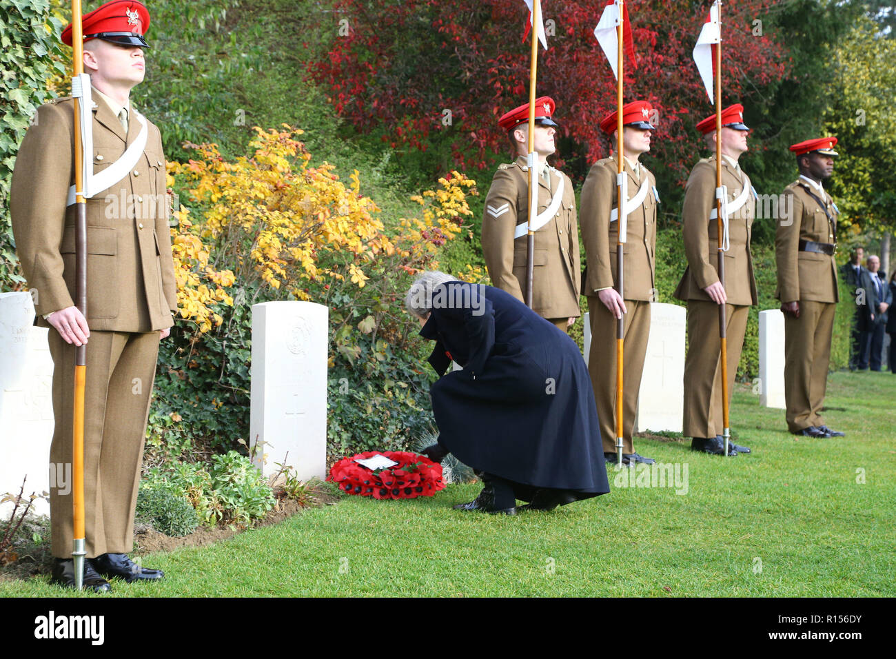 Prime Minister Theresa May at the St Symphorien Military Cemetery in ...