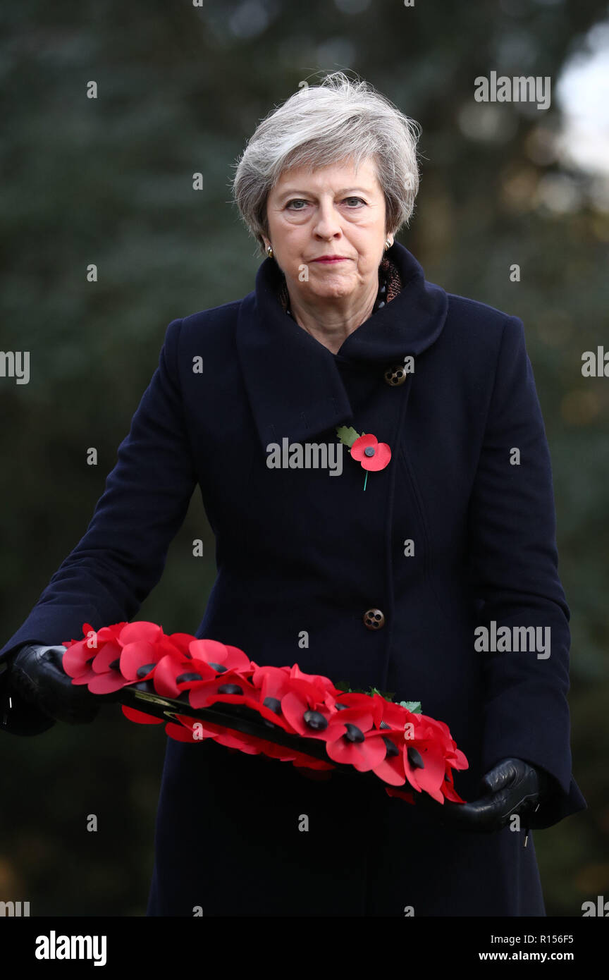 Prime Minister Theresa May at the St Symphorien Military Cemetery in ...