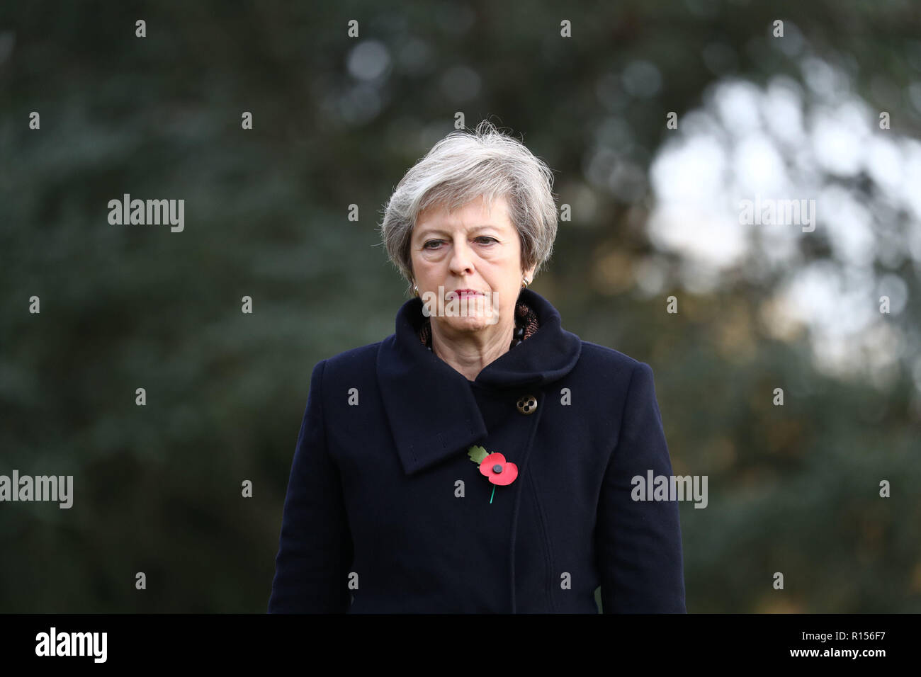 Prime Minister Theresa May at the St Symphorien Military Cemetery in ...