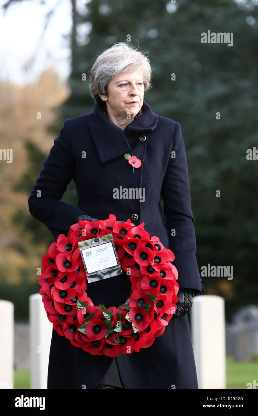 Prime Minister Theresa May at the St Symphorien Military Cemetery in ...
