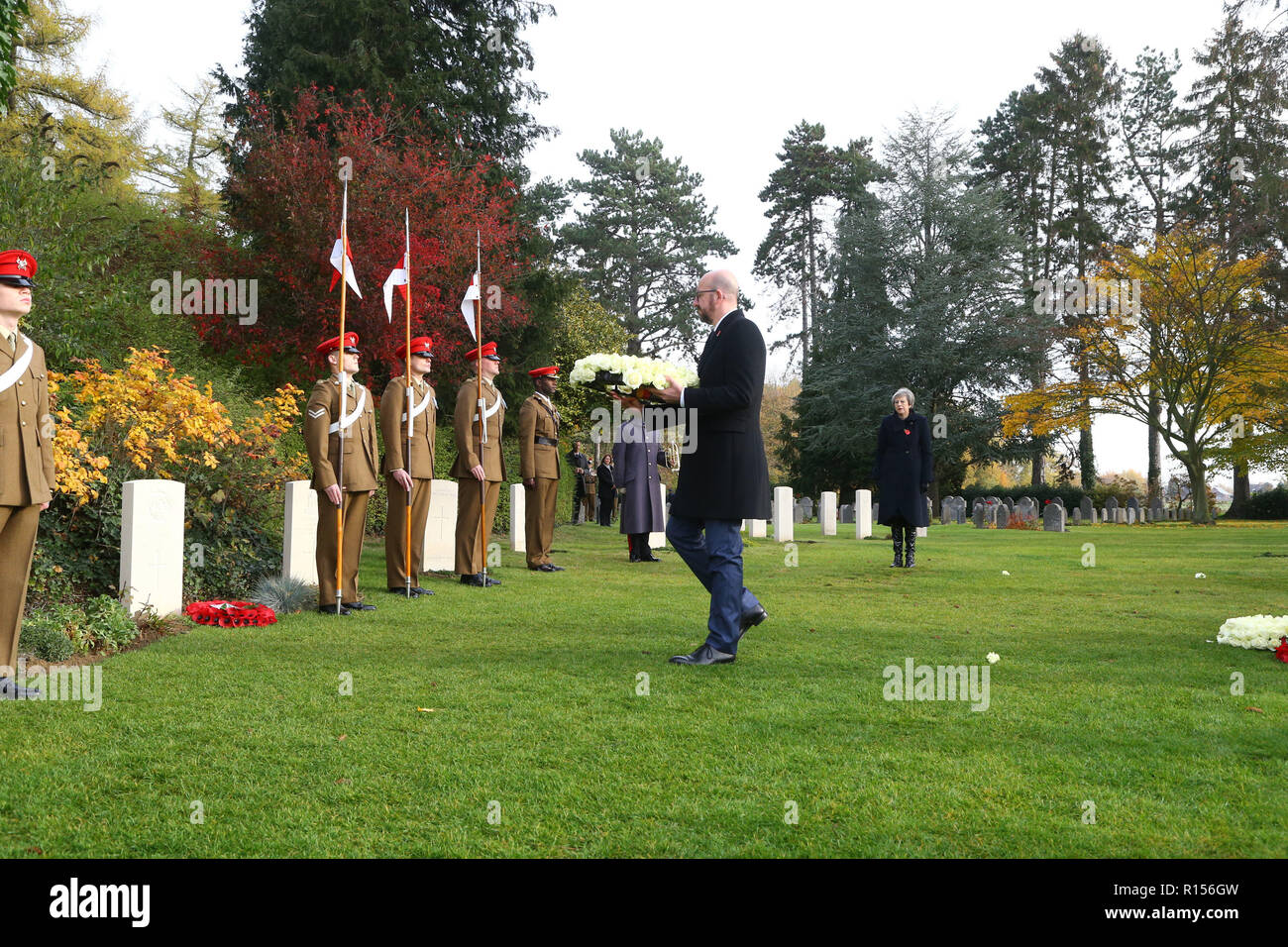 Prime Minister Theresa May at the St Symphorien Military Cemetery in ...