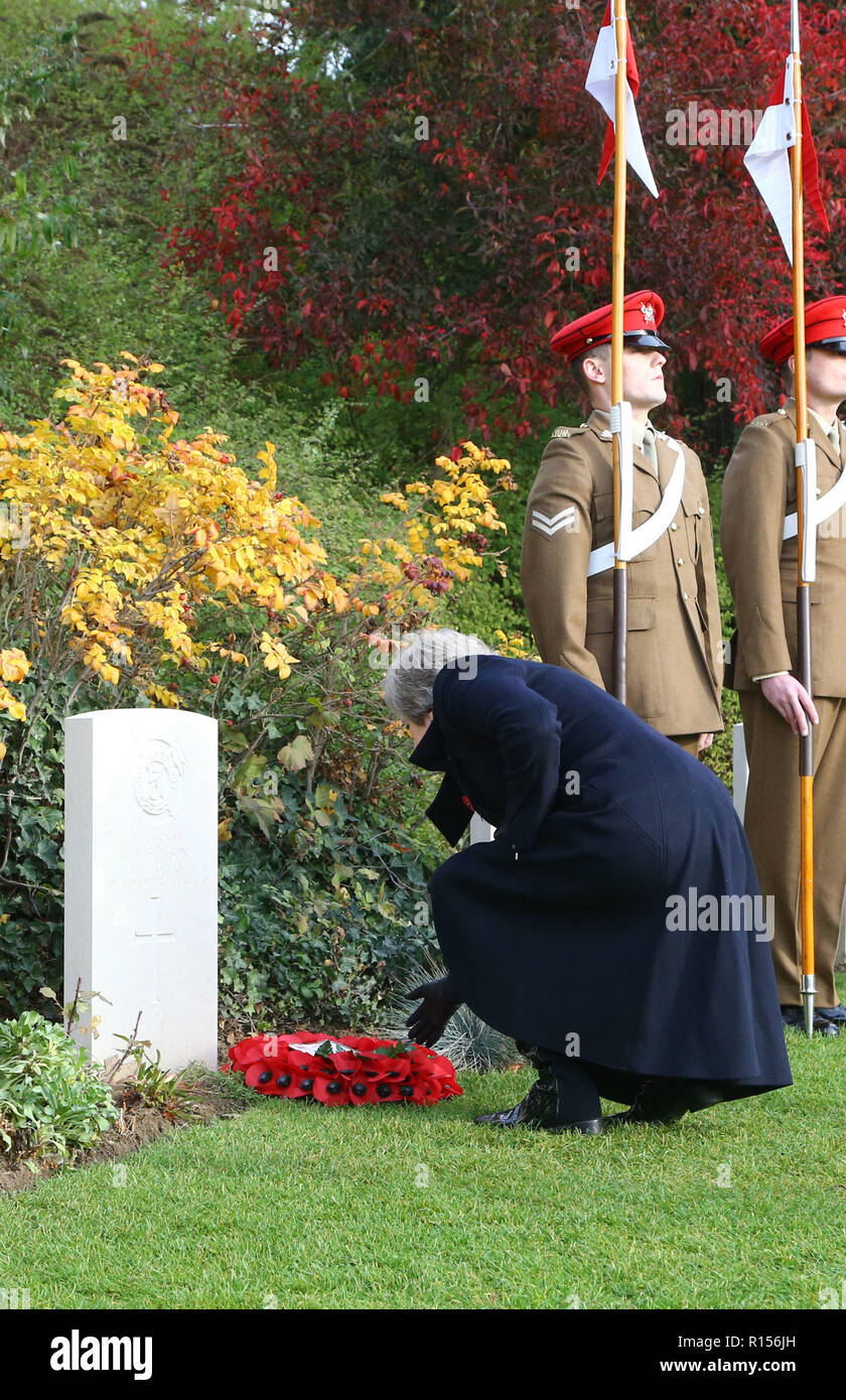 Prime Minister Theresa May at the St Symphorien Military Cemetery in ...