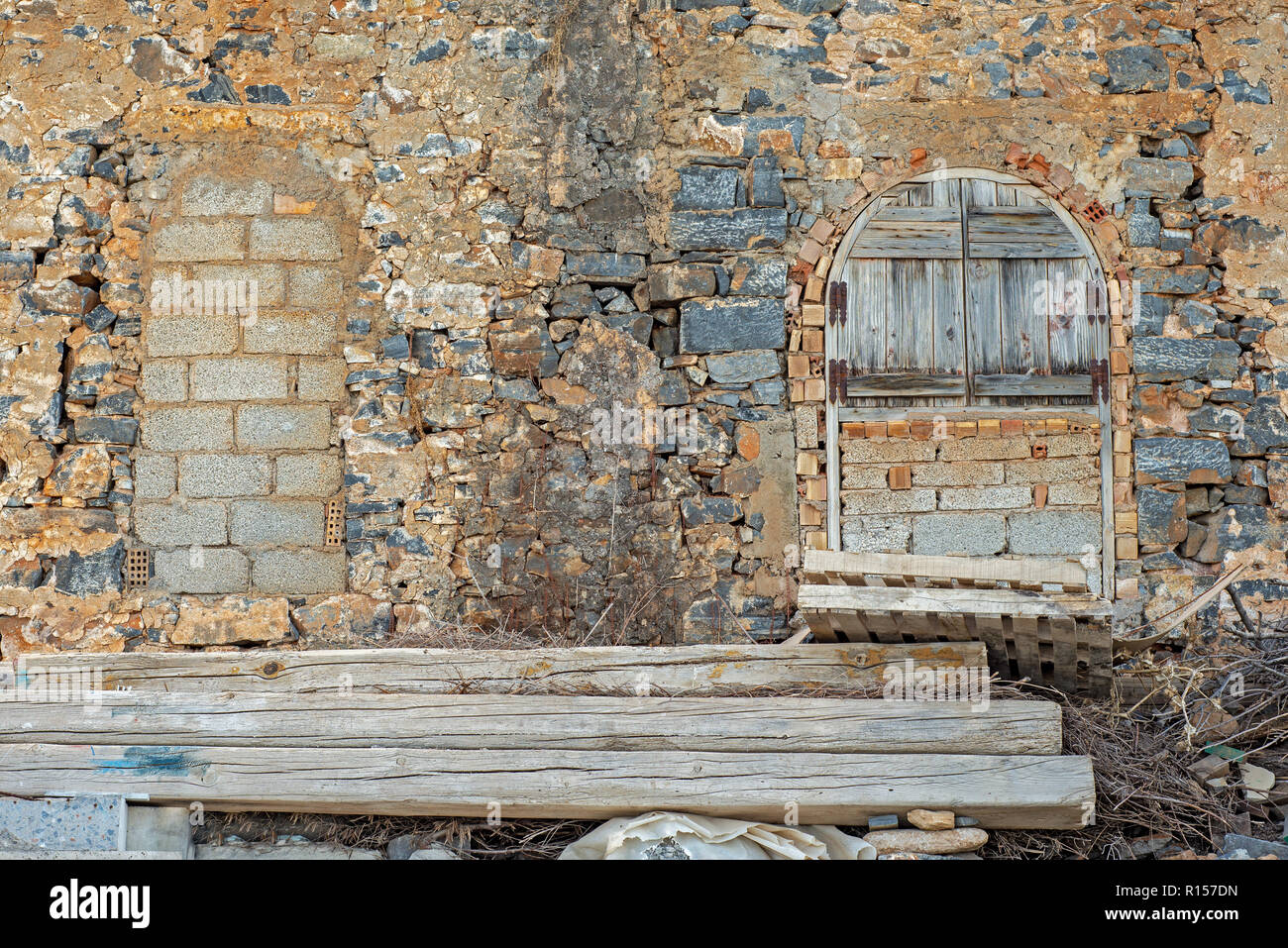 abandoned grunge building with boarded up windows Stock Photo - Alamy