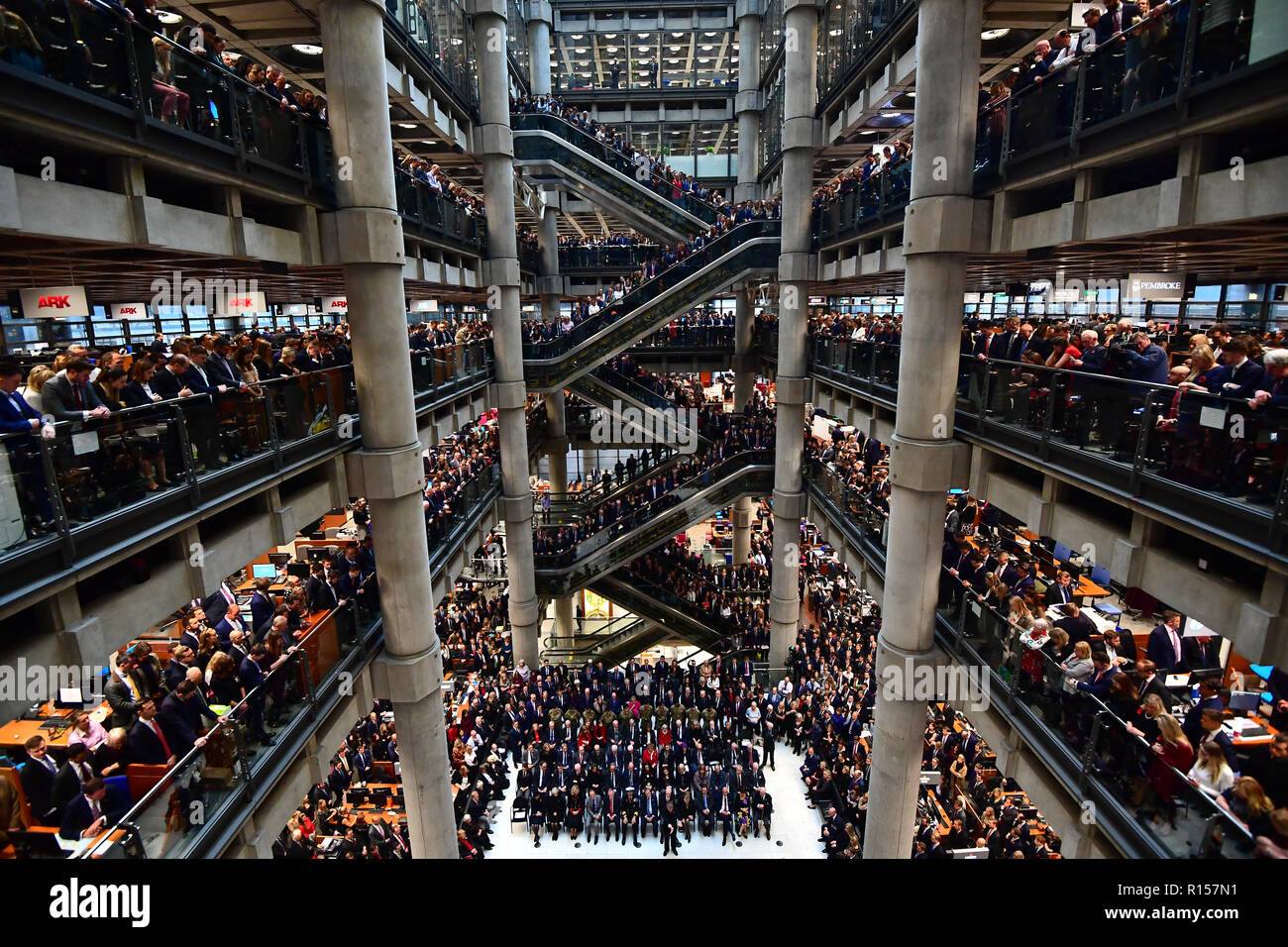 Staff line the atrium during the Lloyd's of London Armistice ...