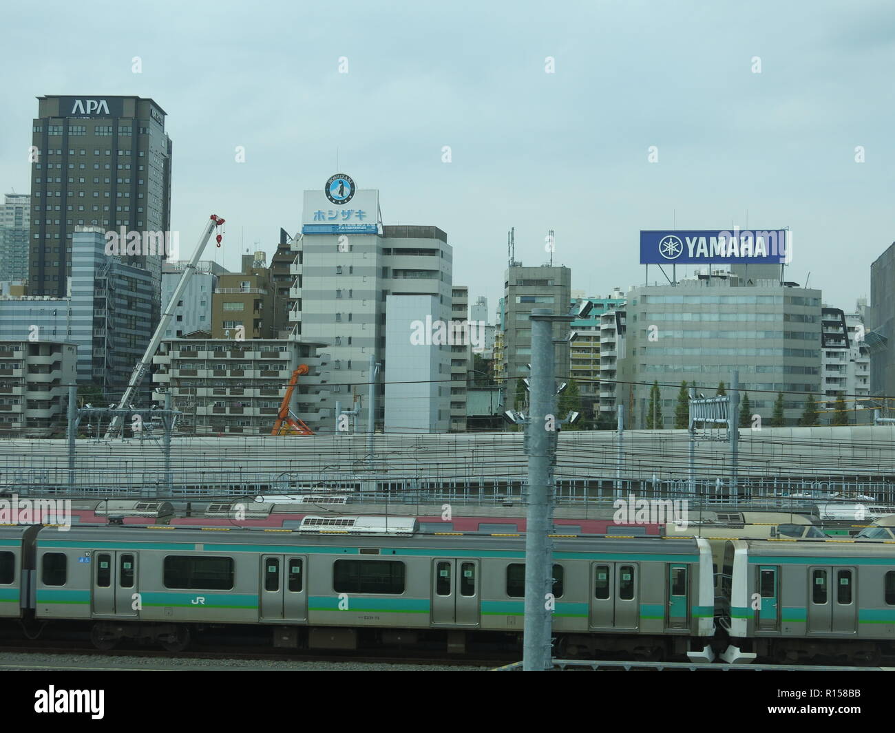 View of modern Tokyo as you approach the railway station; high rise ...