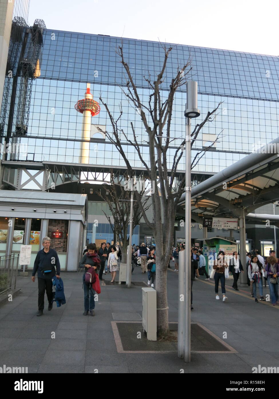 A view of the outside of the busy Kyoto train station; the whole ...