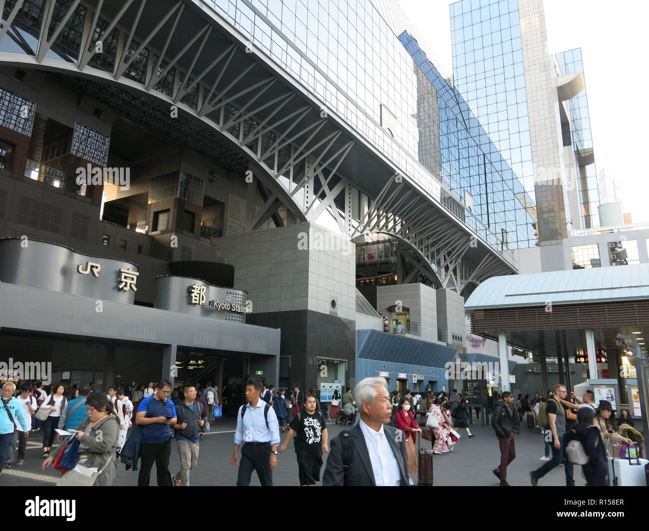 A view of the outside of the busy Kyoto train station; the whole ...