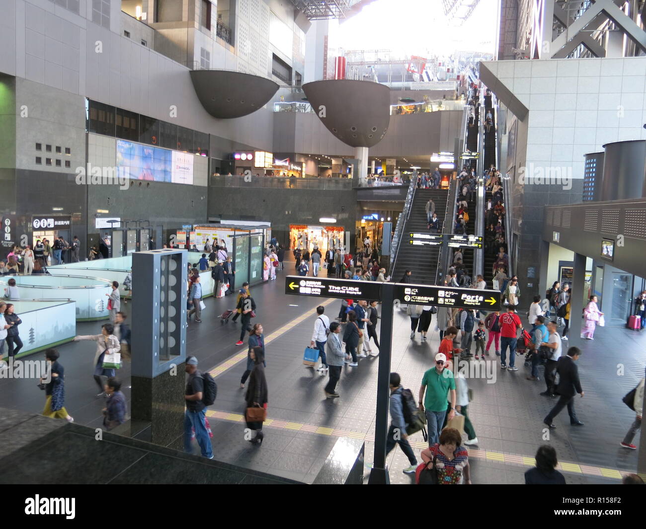 An interior view of the modern station complex and shopping centre at ...