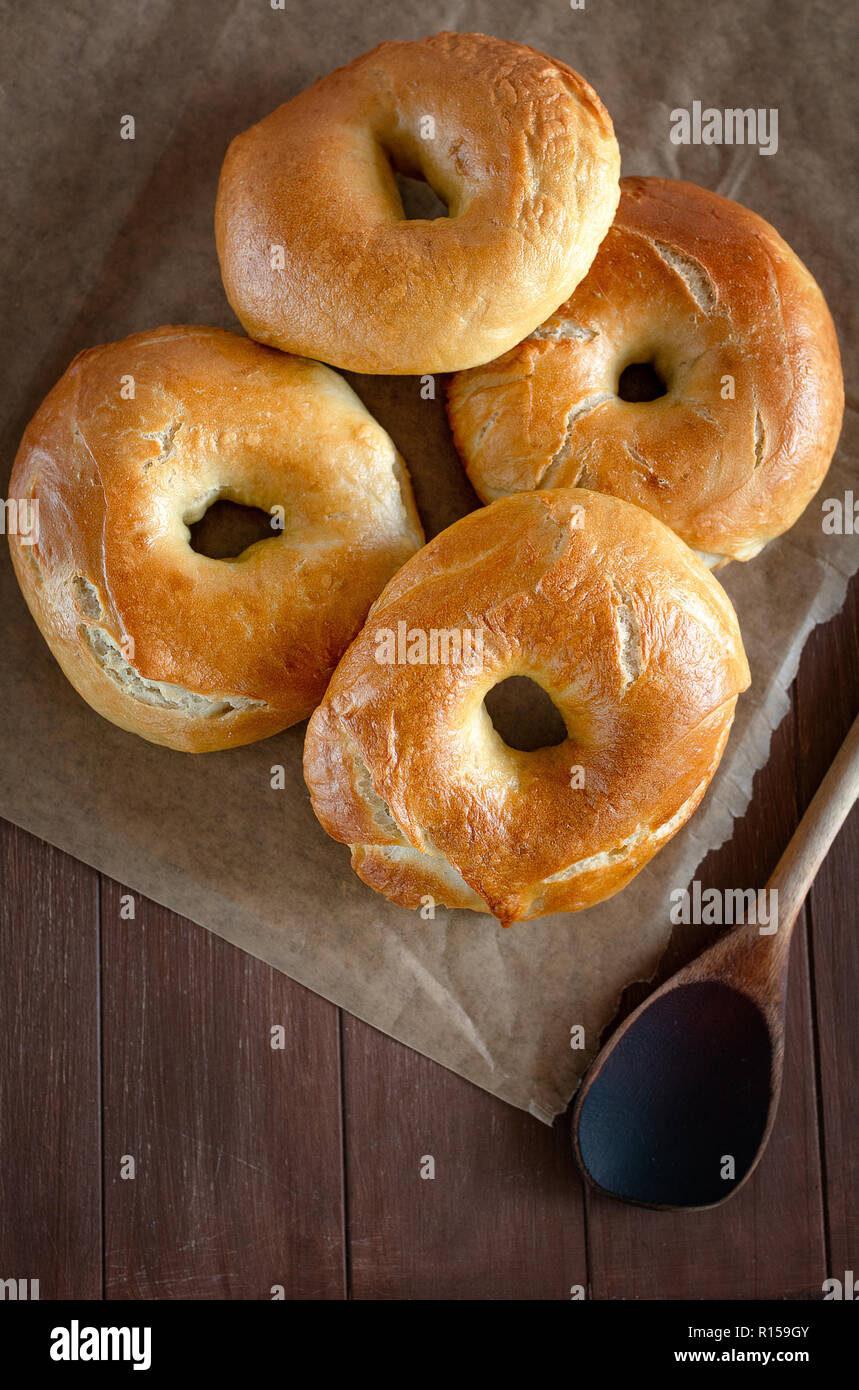 Even baked bagels lie on a piece of baking paper Stock Photo - Alamy