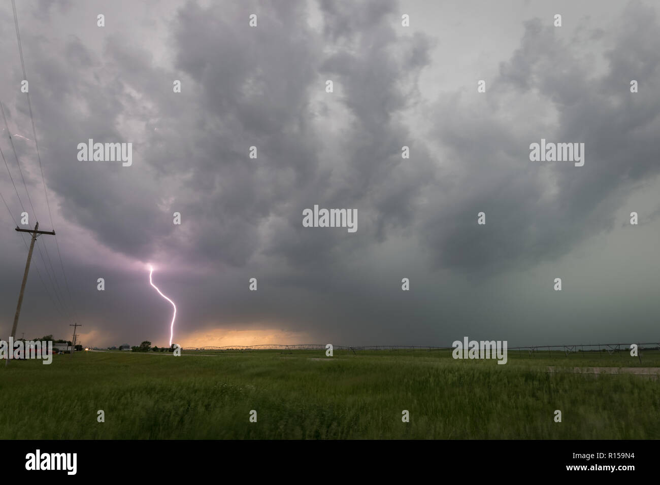 A strong vivid lightningbolt strikes down from a severe Nebraska ...
