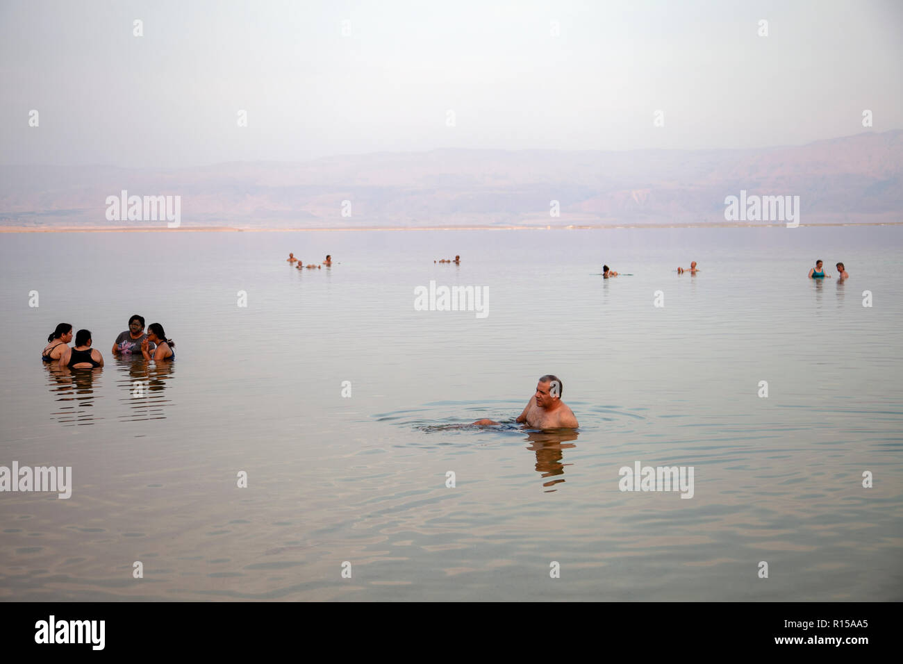 Visitors Bathing in the Dead Sea in Israel Stock Photo - Alamy