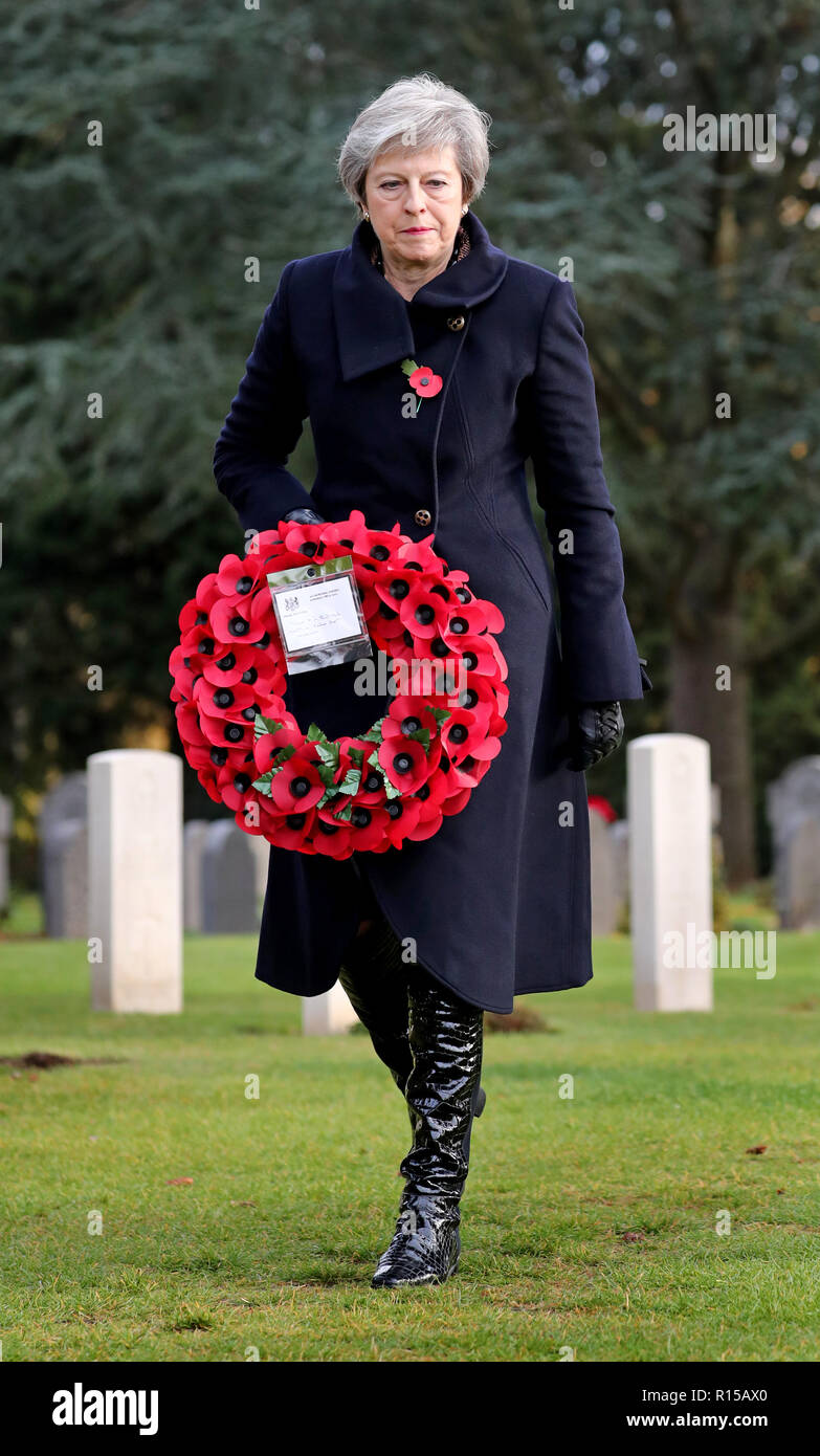 Prime Minister Theresa May at the St Symphorien Military Cemetery in ...