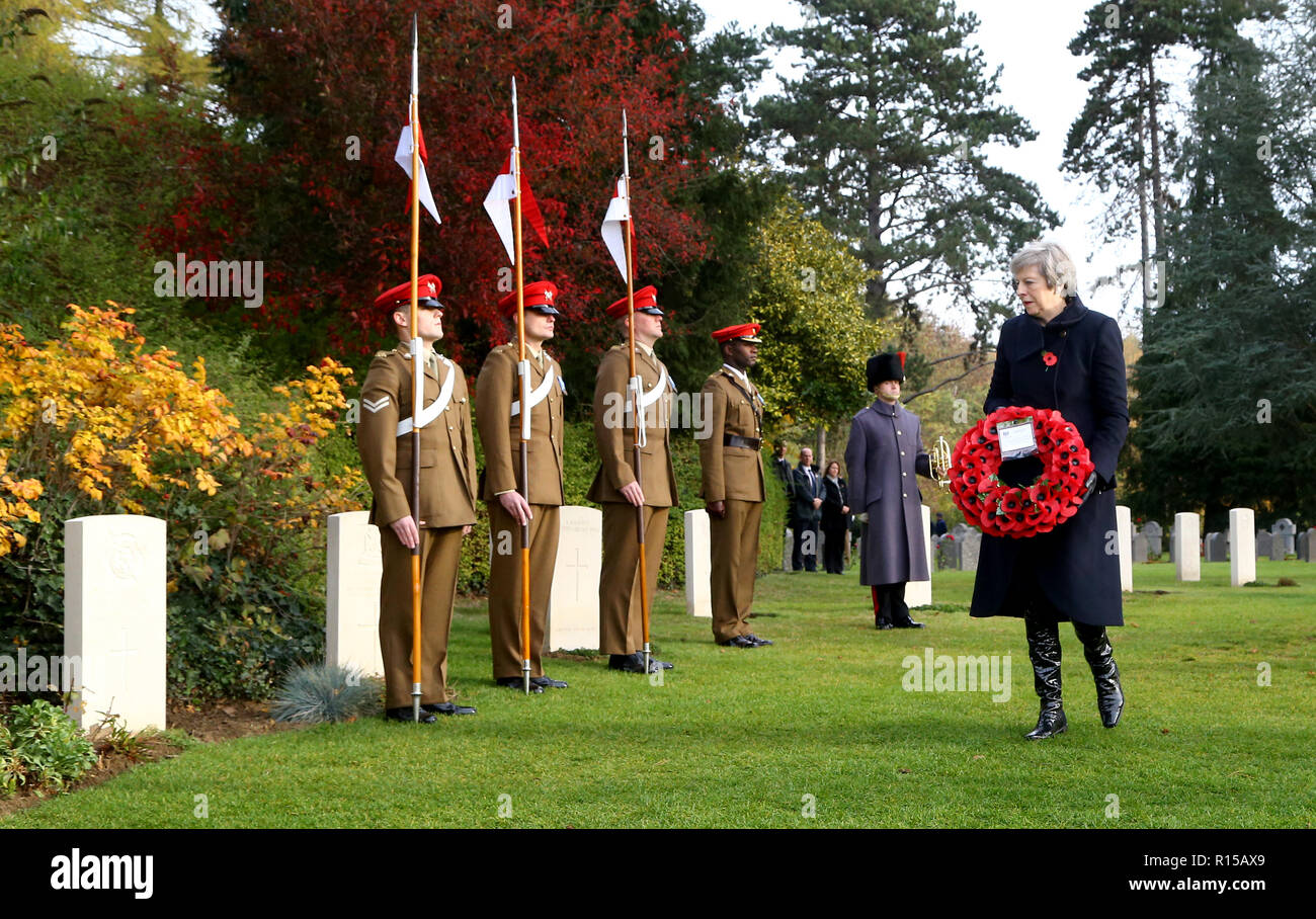 Prime Minister Theresa May at the St Symphorien Military Cemetery in ...