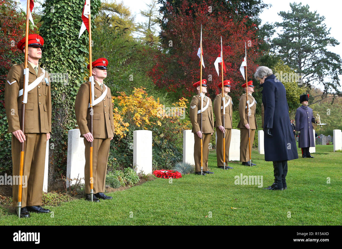 Prime Minister Theresa May at the St Symphorien Military Cemetery in ...