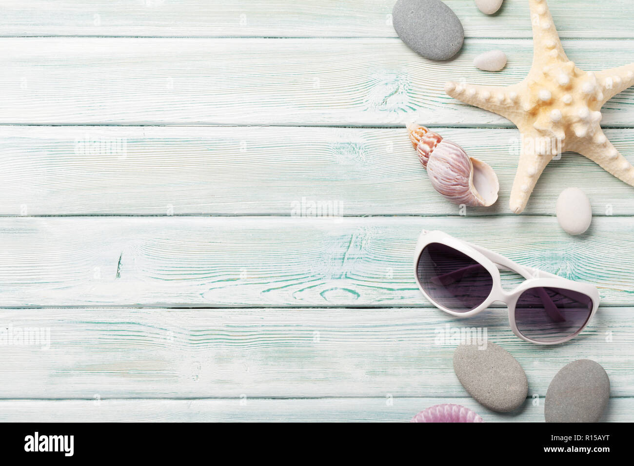 Travel vacation table concept with seashells and sunglasses on wooden ...