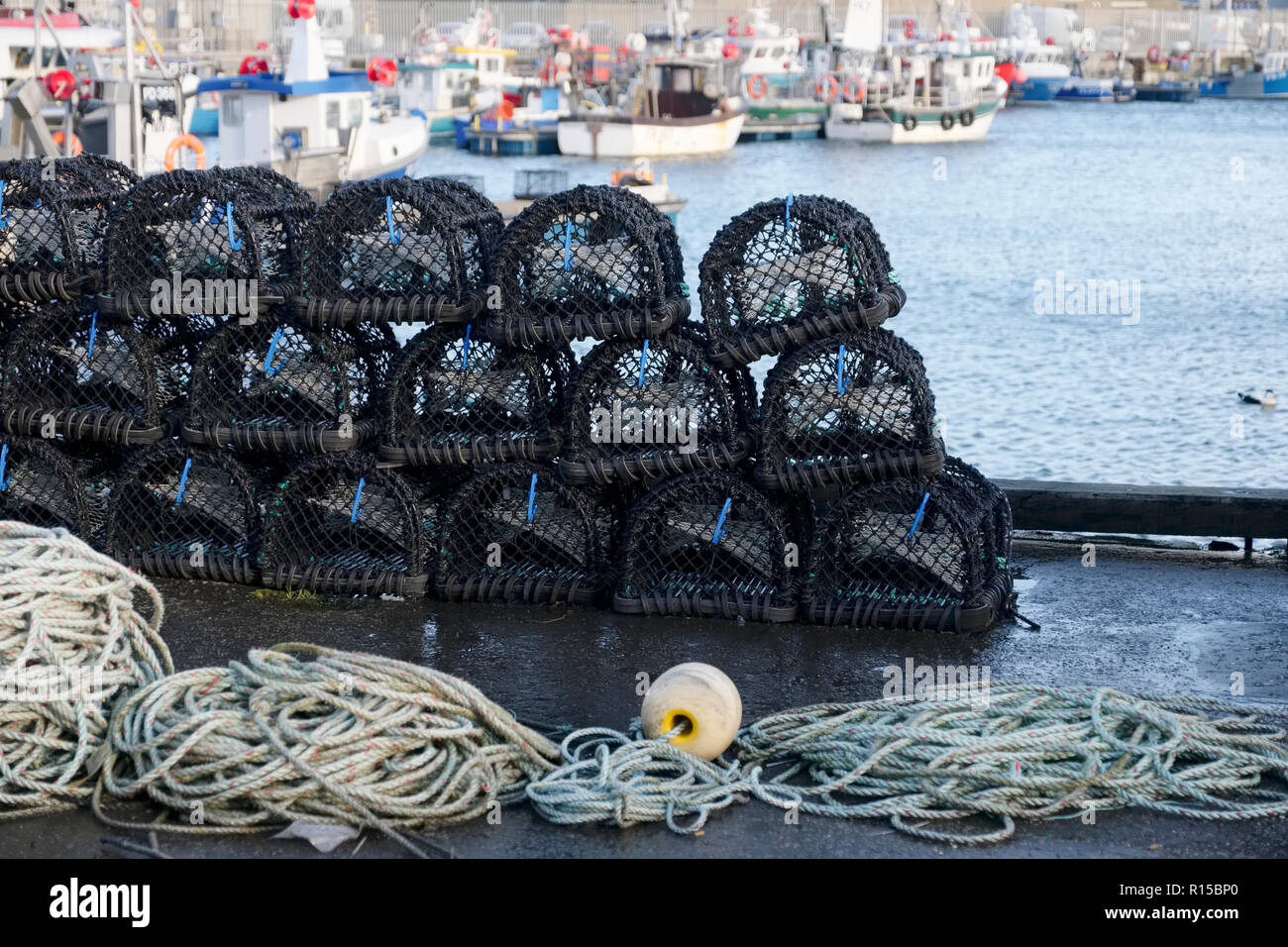 Many stacked lobster baskets hi-res stock photography and images - Alamy