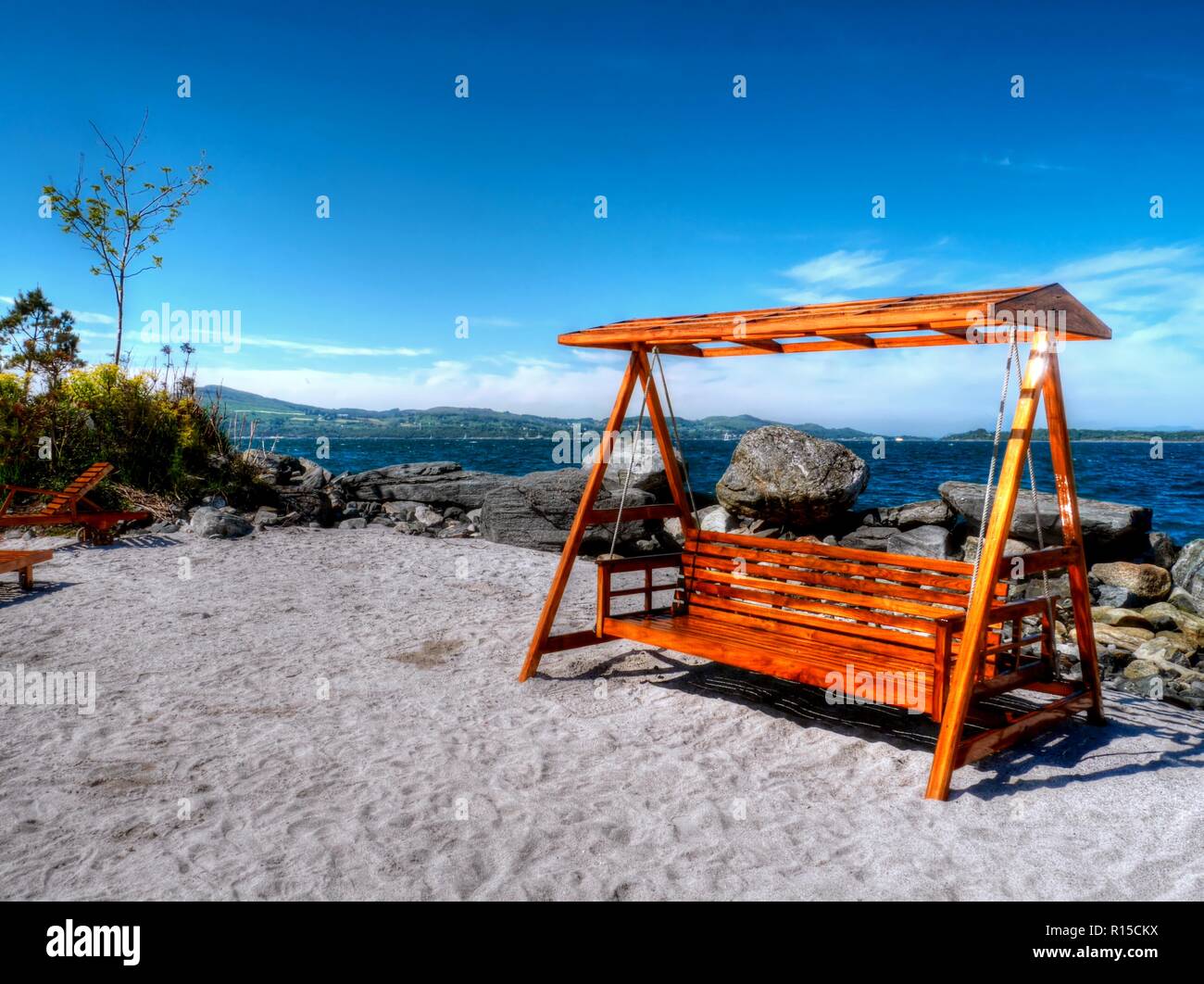 Rocking bench in a beach, Flor og Fjaere, Stavanger, Norway Stock Photo ...
