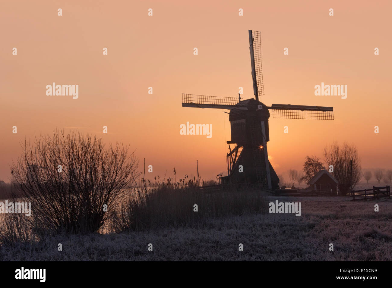 Typical vintage Dutch sunset landscape in the rural area of The ...