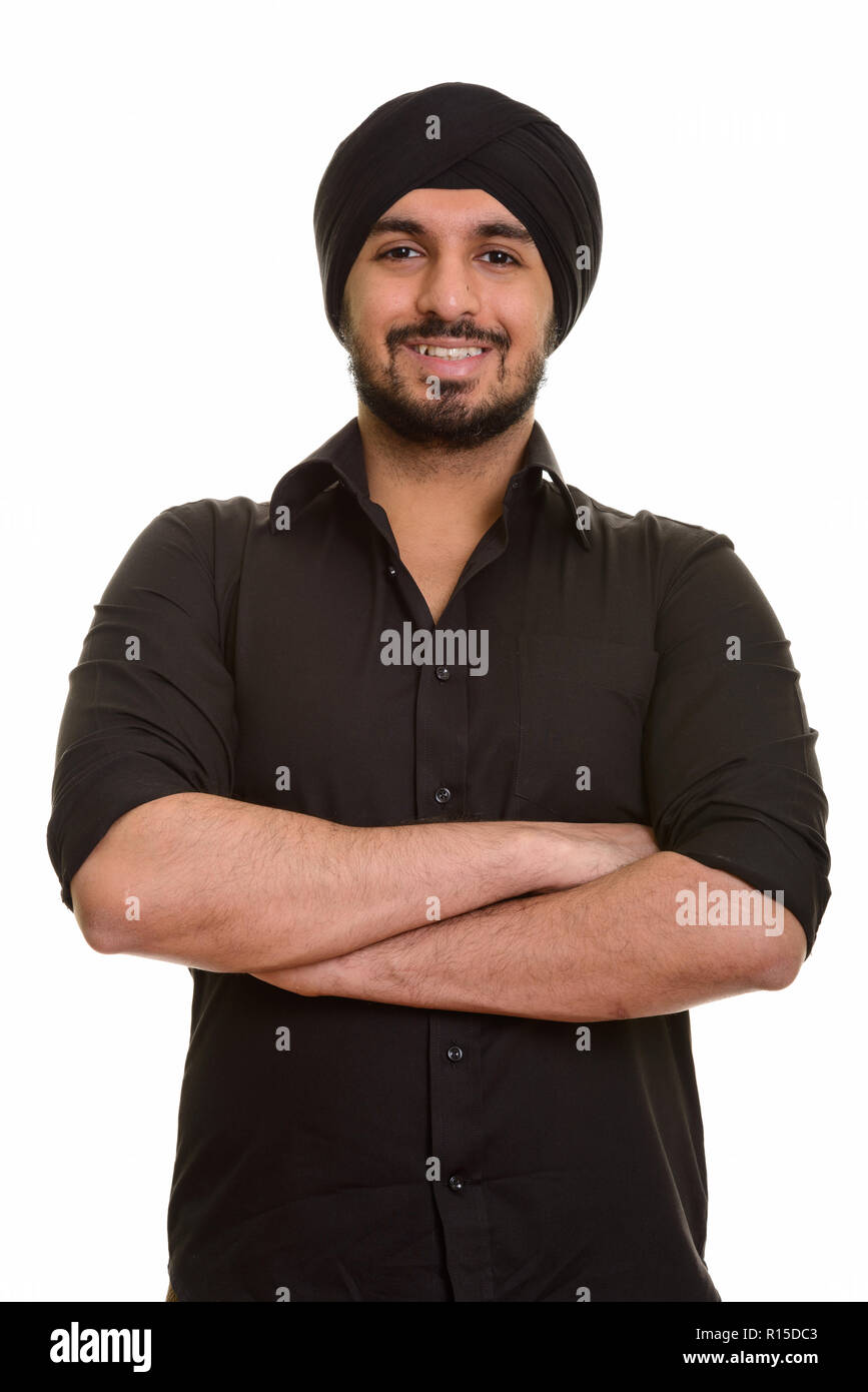 Portrait of young happy Indian Sikh man smiling Stock Photo - Alamy