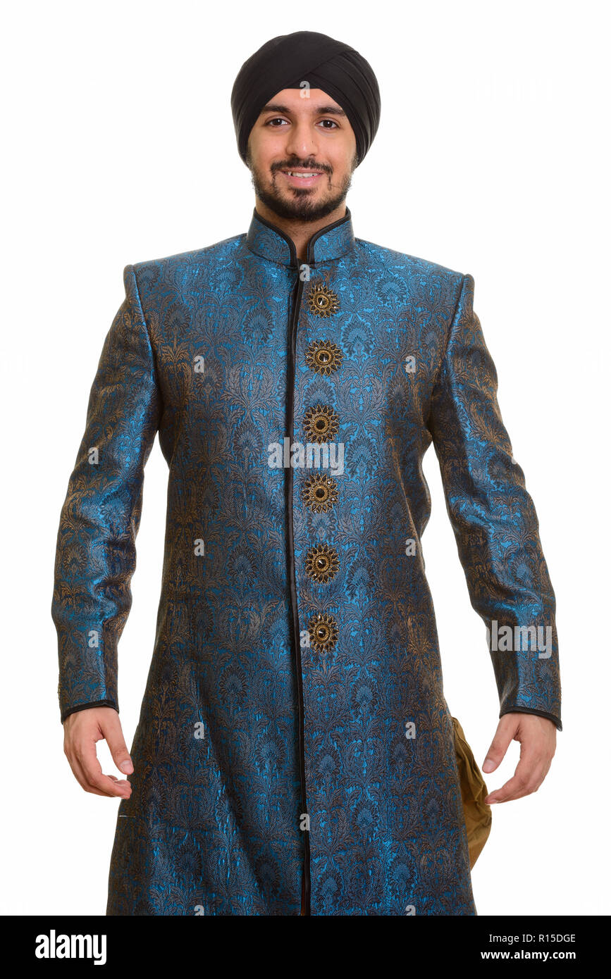 Young happy Indian Sikh smiling wearing traditional clothes Stock Photo ...