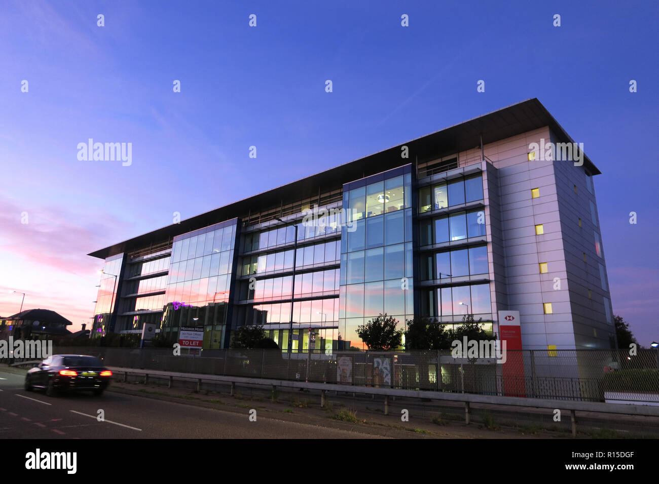 HSBC office block with sunset reflection in windows, Cranford near ...