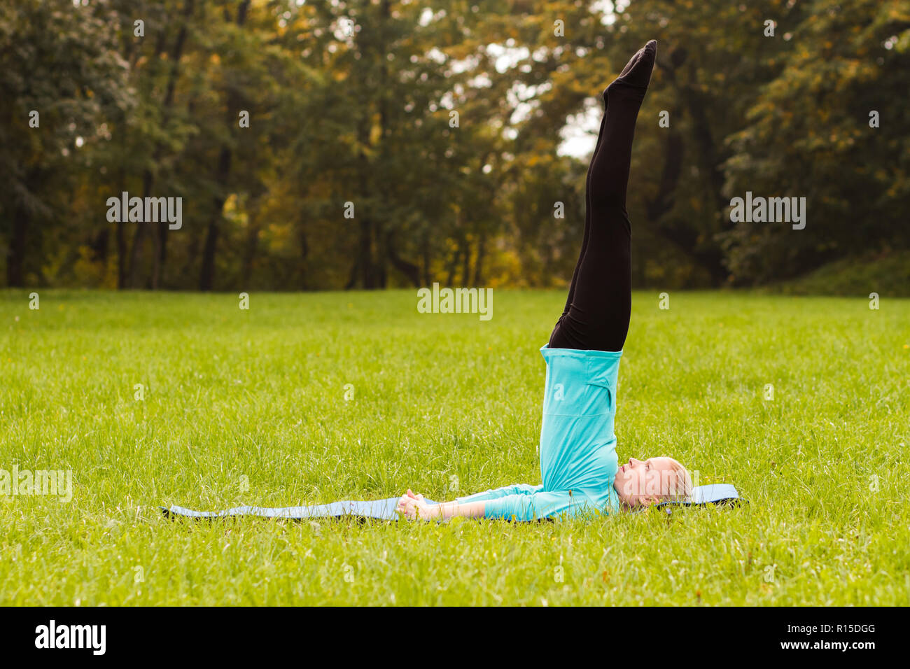Yoga posture hands behind back hi-res stock photography and images - Alamy