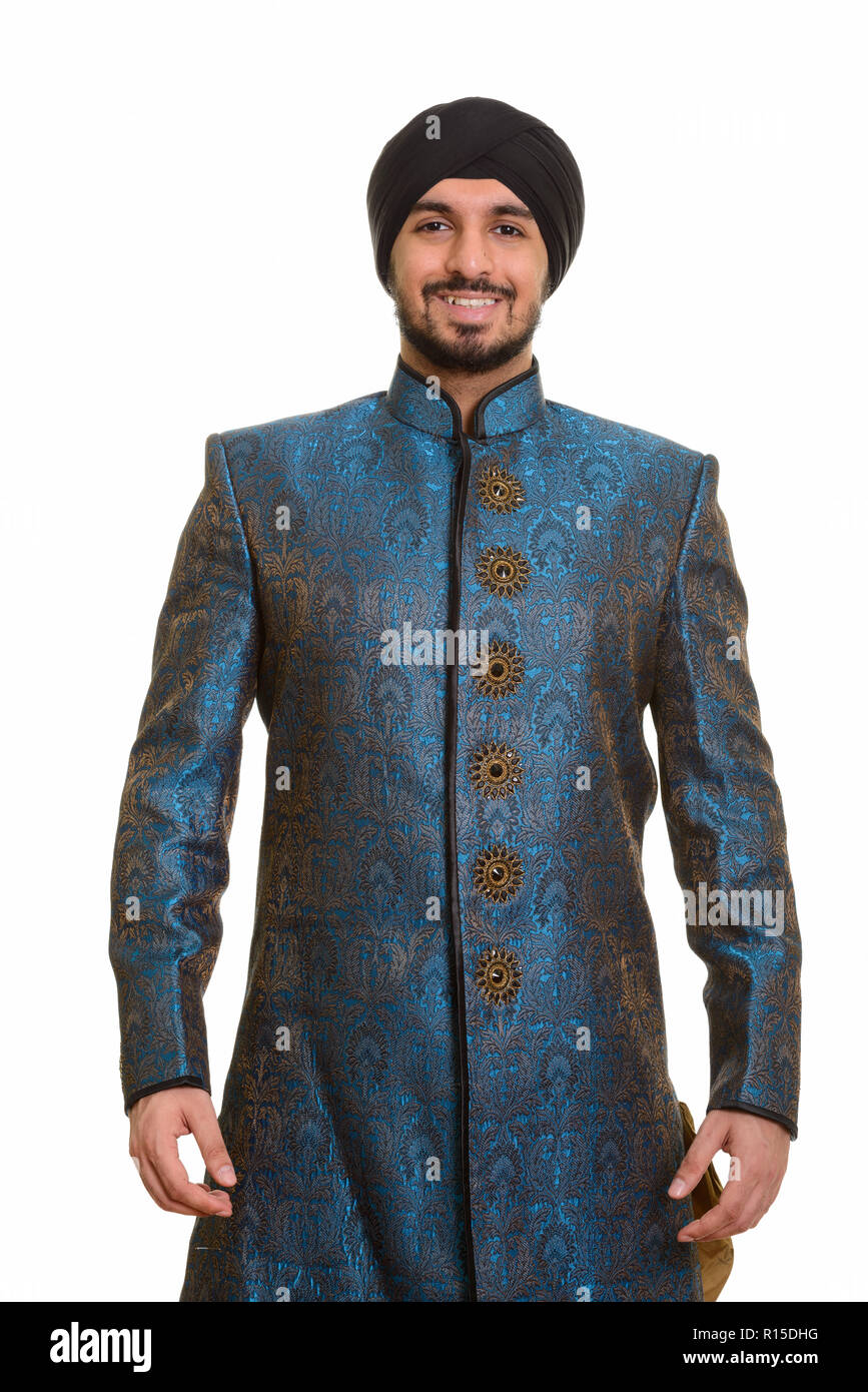 Young happy Indian Sikh smiling wearing traditional clothes Stock Photo ...