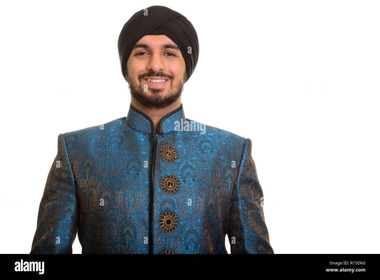 Young happy Indian Sikh smiling wearing traditional clothes Stock Photo ...