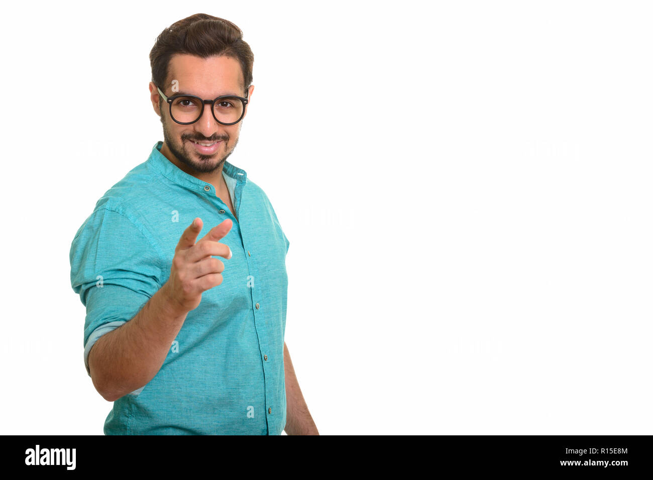Young happy Indian man pointing finger at camera Stock Photo - Alamy