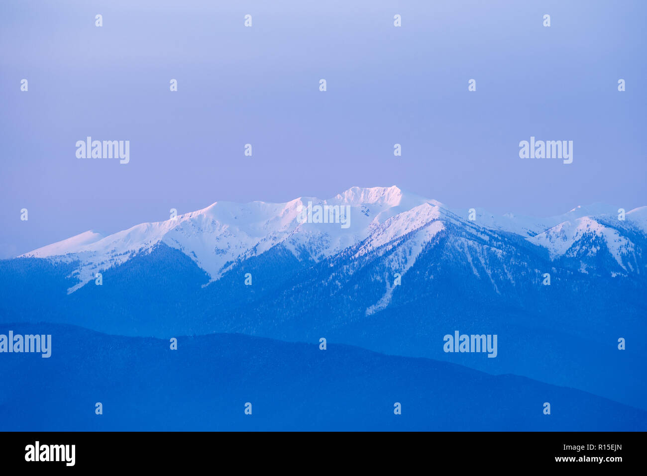 Snowy mountain peak. Winter background with copy space for text. View ...