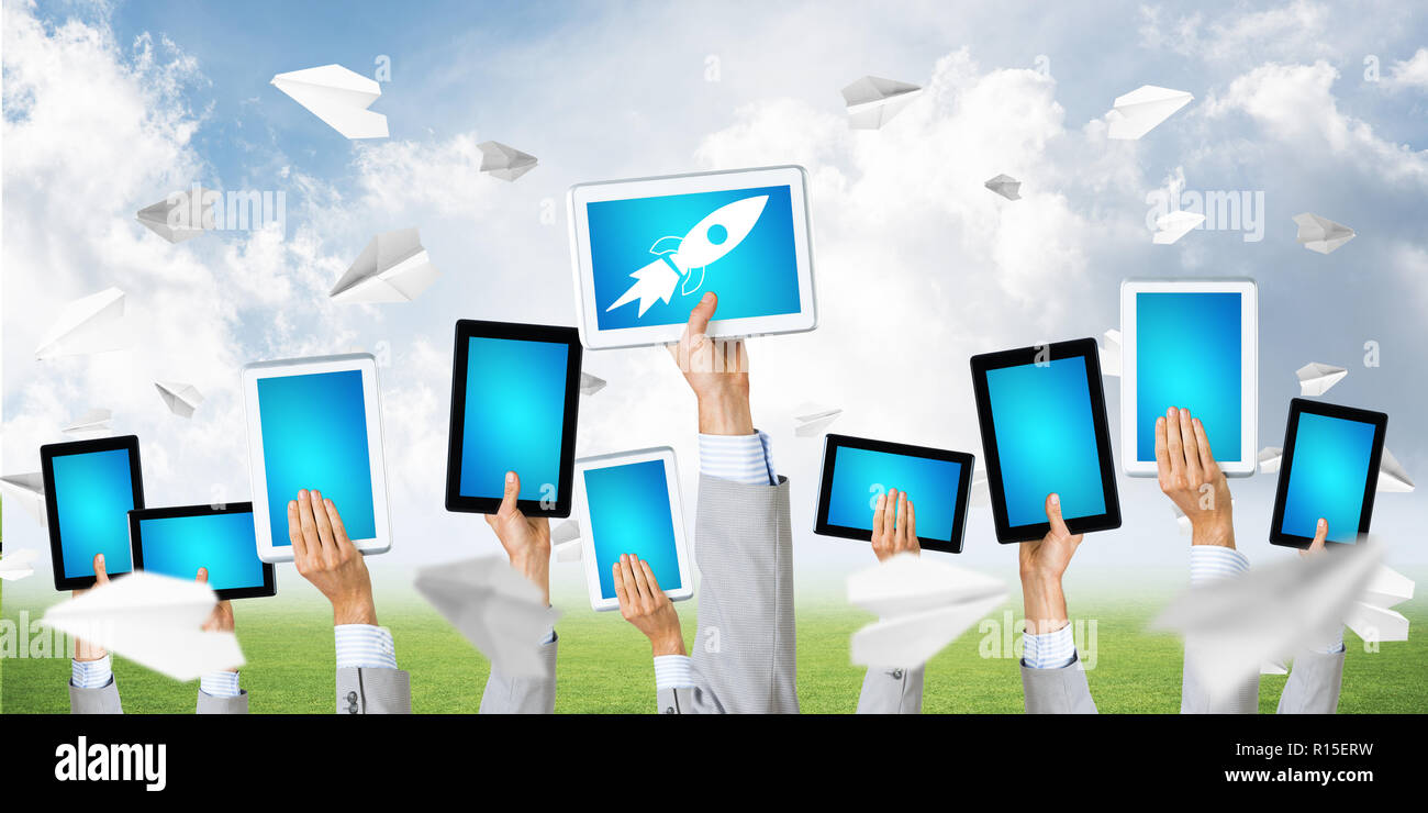 Close of businessman hands in line showing tablet pc with blank blue ...