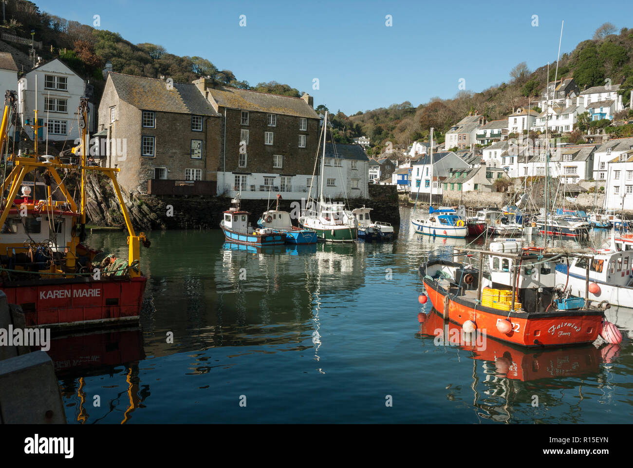 View of the pretty historic Cornish fishing village of Polperro with ...