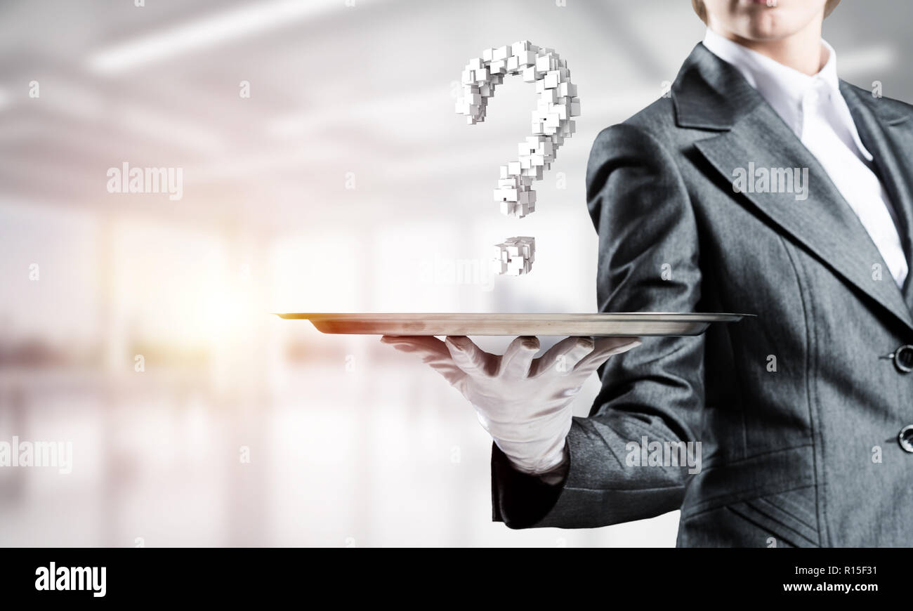 Hand of waiter presenting question mark on tray Stock Photo - Alamy