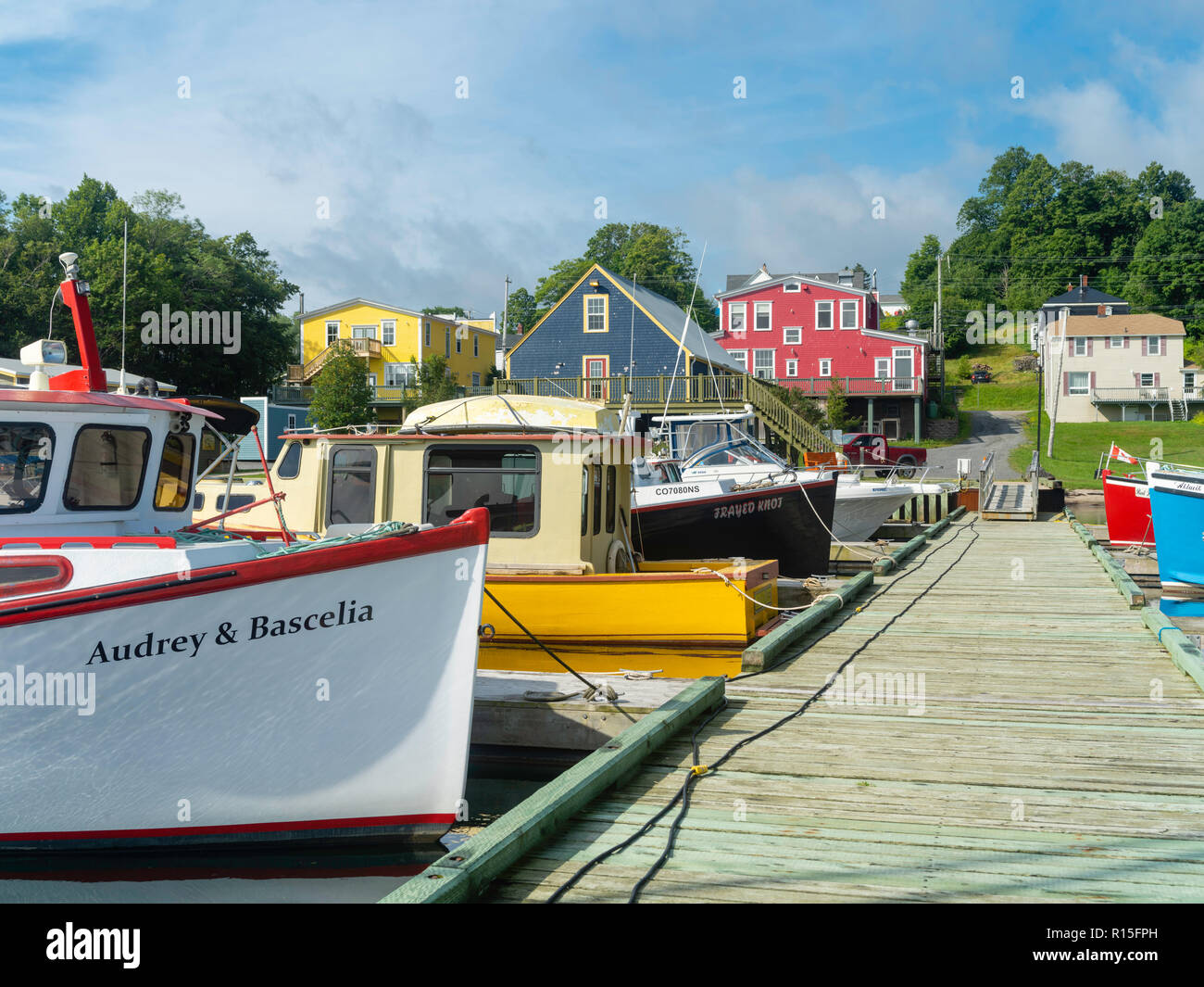 Morning view of fishing boats docked in Guysborough, Nova Scotia ...