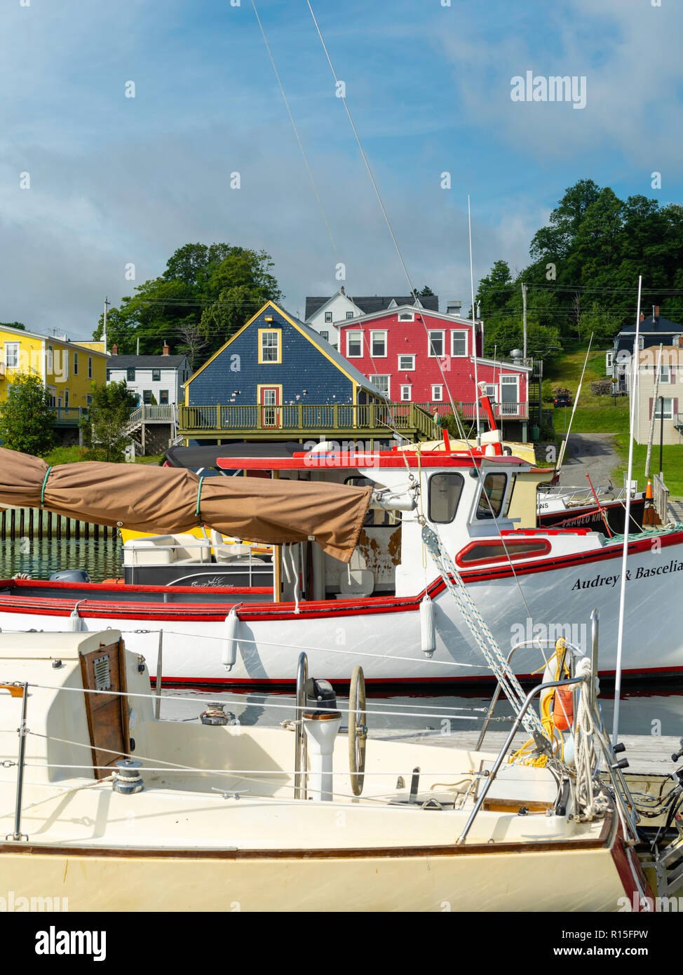 Morning view of fishing boats docked in Guysborough, Nova Scotia ...