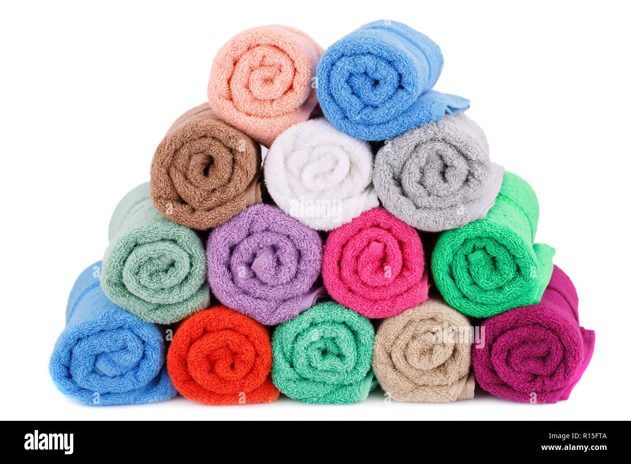 Colorful rolled towels stack isolated on white background Stock Photo ...