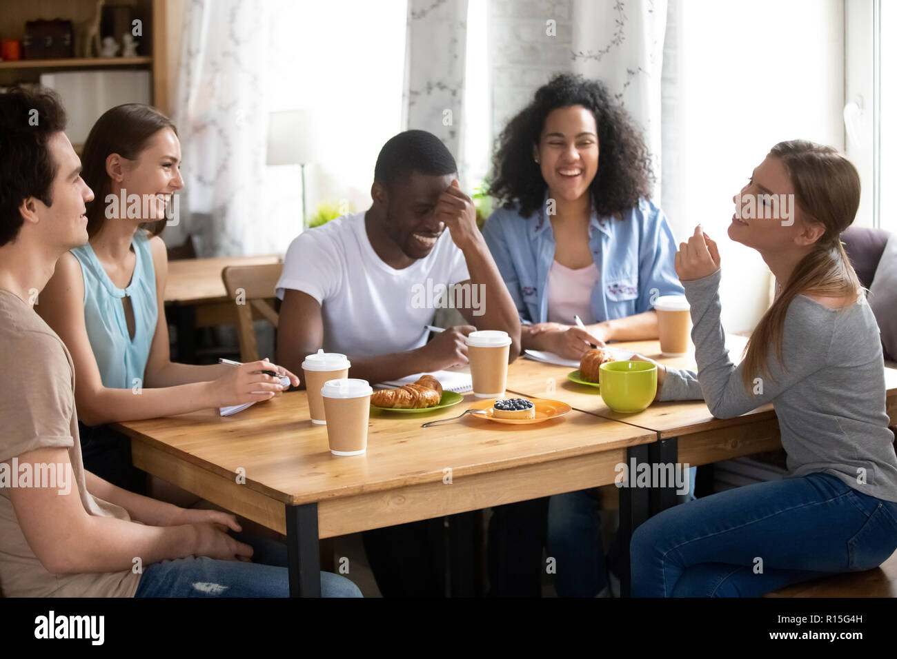 Women talking during meal hi-res stock photography and images - Alamy