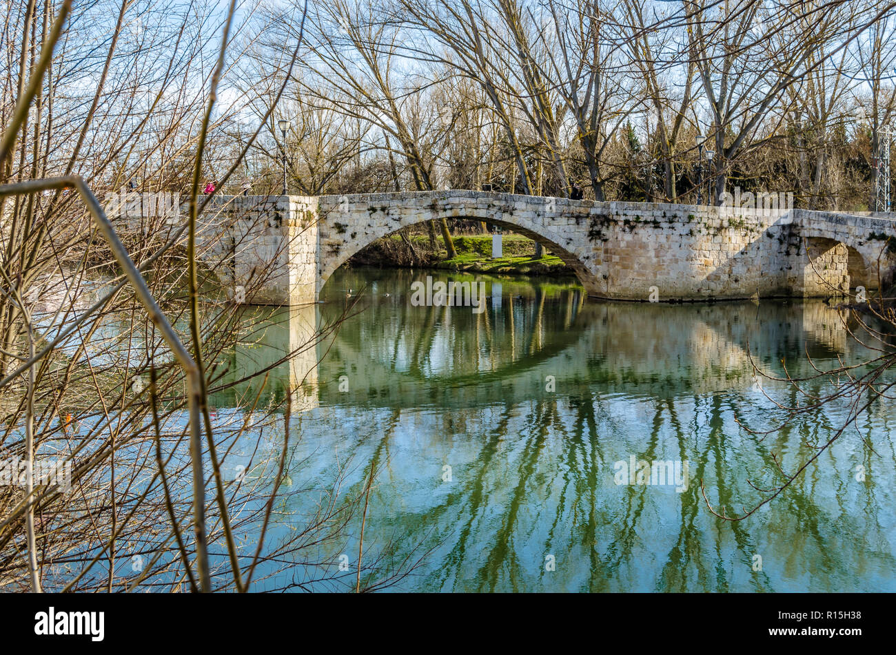 Medieval stone bridge over the Carrion River in Palencia (Castile and ...