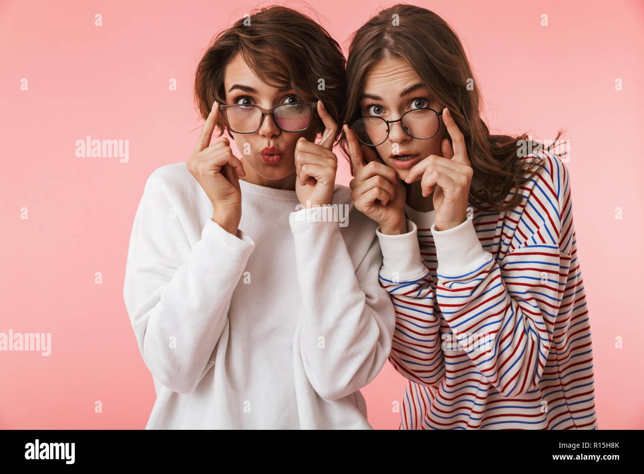 Image of shocked emotional young women friends posing isolated over ...