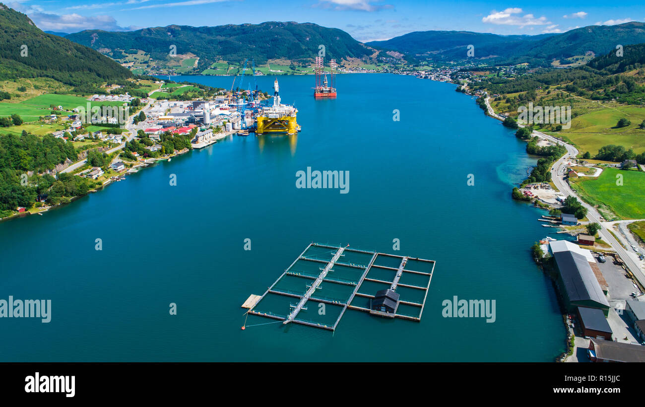 Oil rigs and salmon farm in fjord. Olen, Norway Stock Photo - Alamy