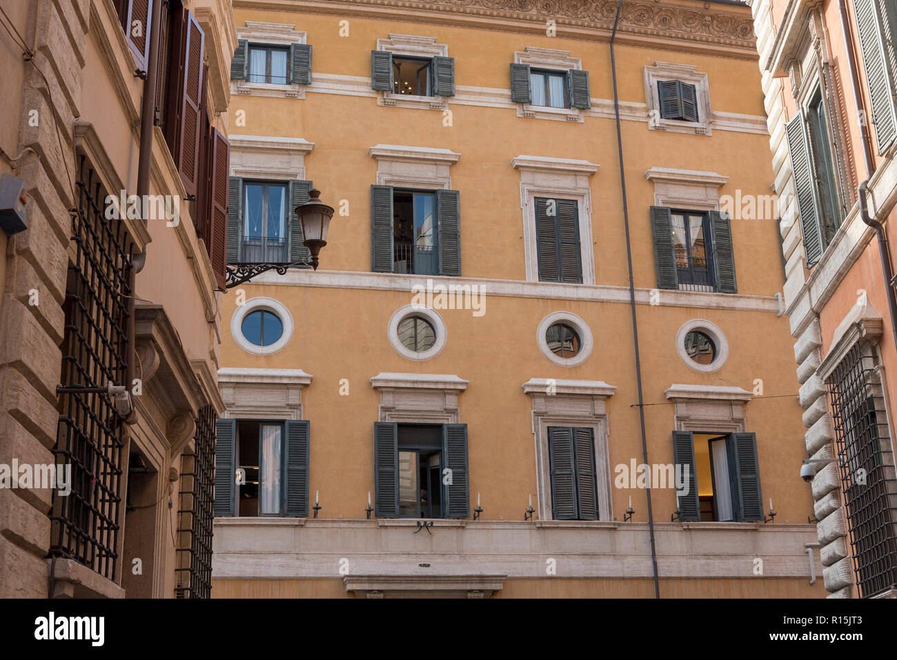 Windows of houses of old houses of Rome in Italy. Beautiful building ...