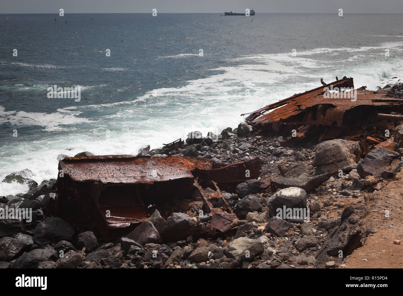 rusting boat remains on beach Stock Photo - Alamy