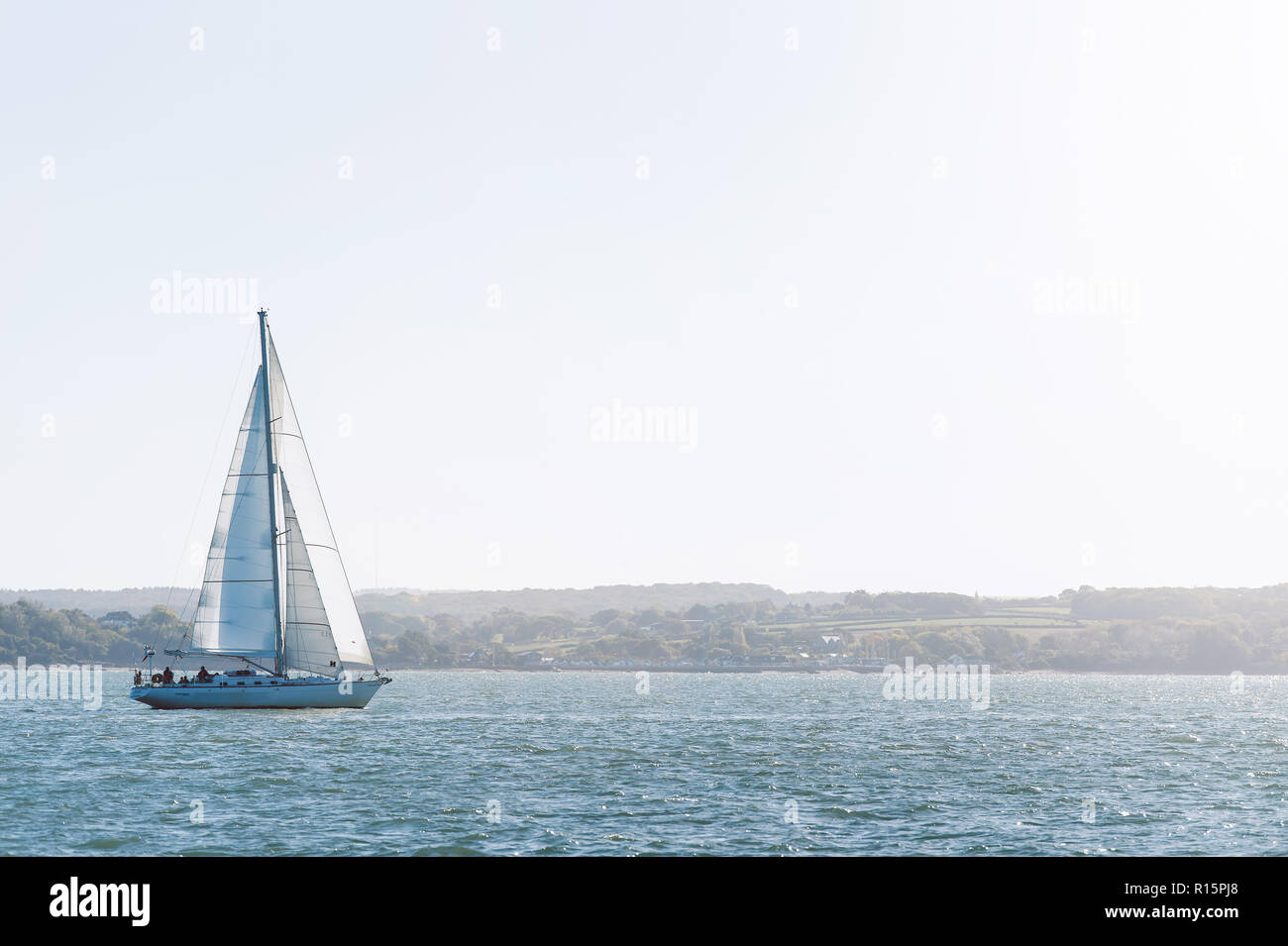 Yacht under sail at sea Stock Photo - Alamy