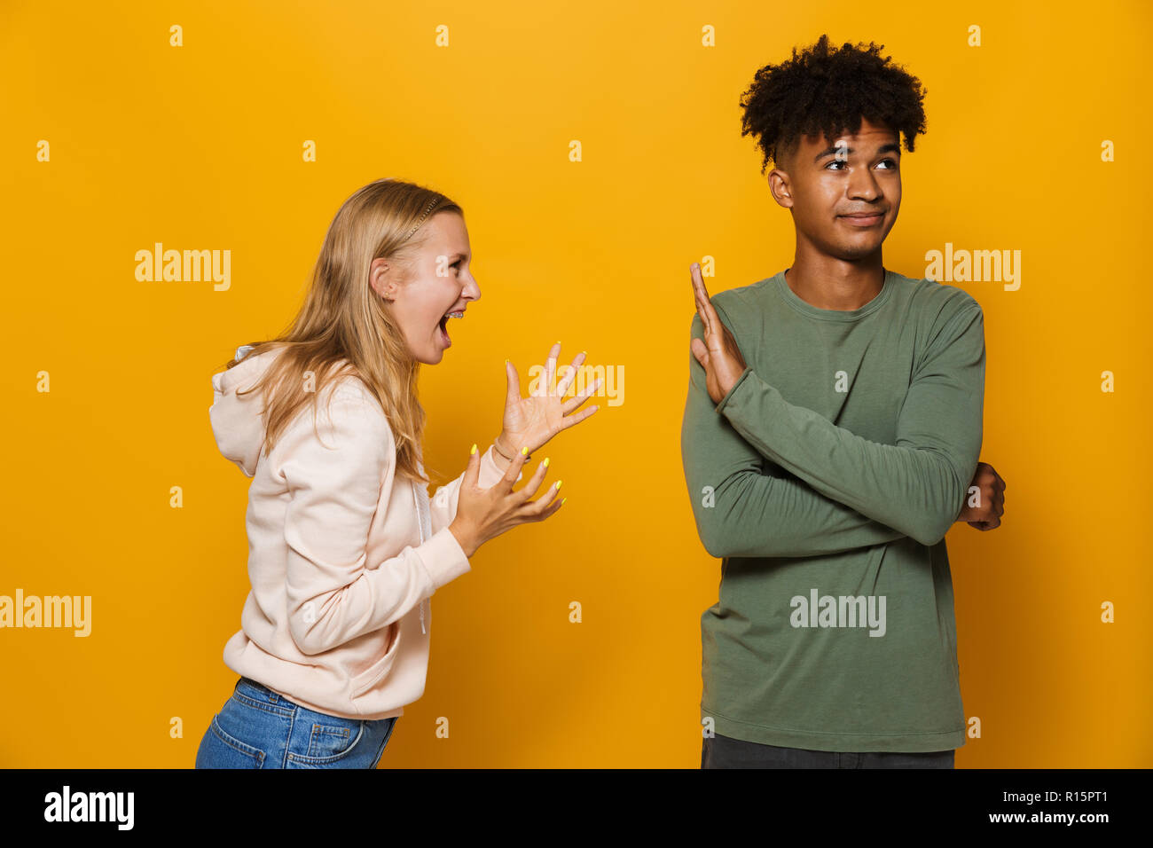 Photo of stressed woman 16-18 arguing and screaming at young man ...