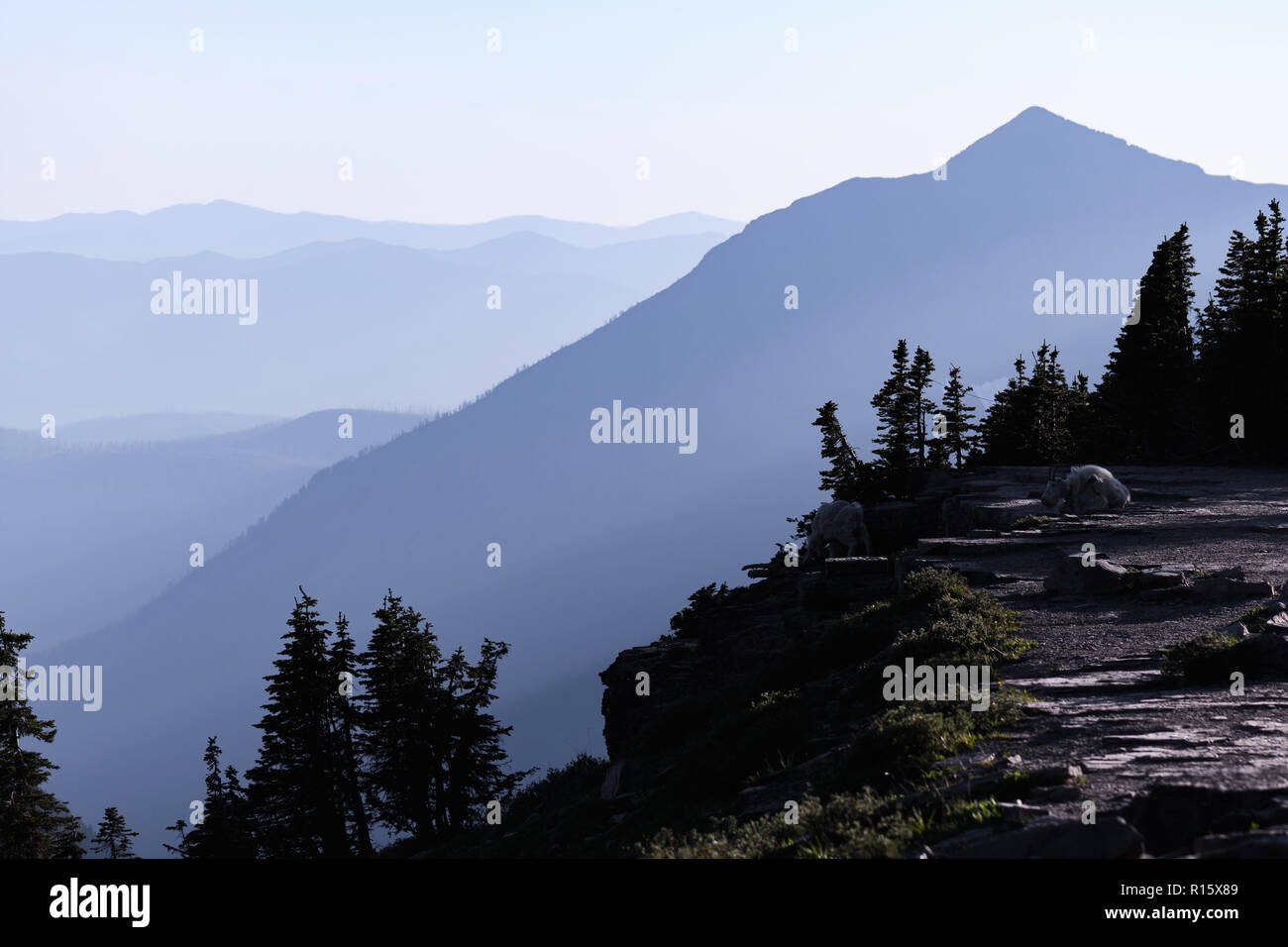 Smoky mountain haze from wildfires with sun rays Stock Photo - Alamy