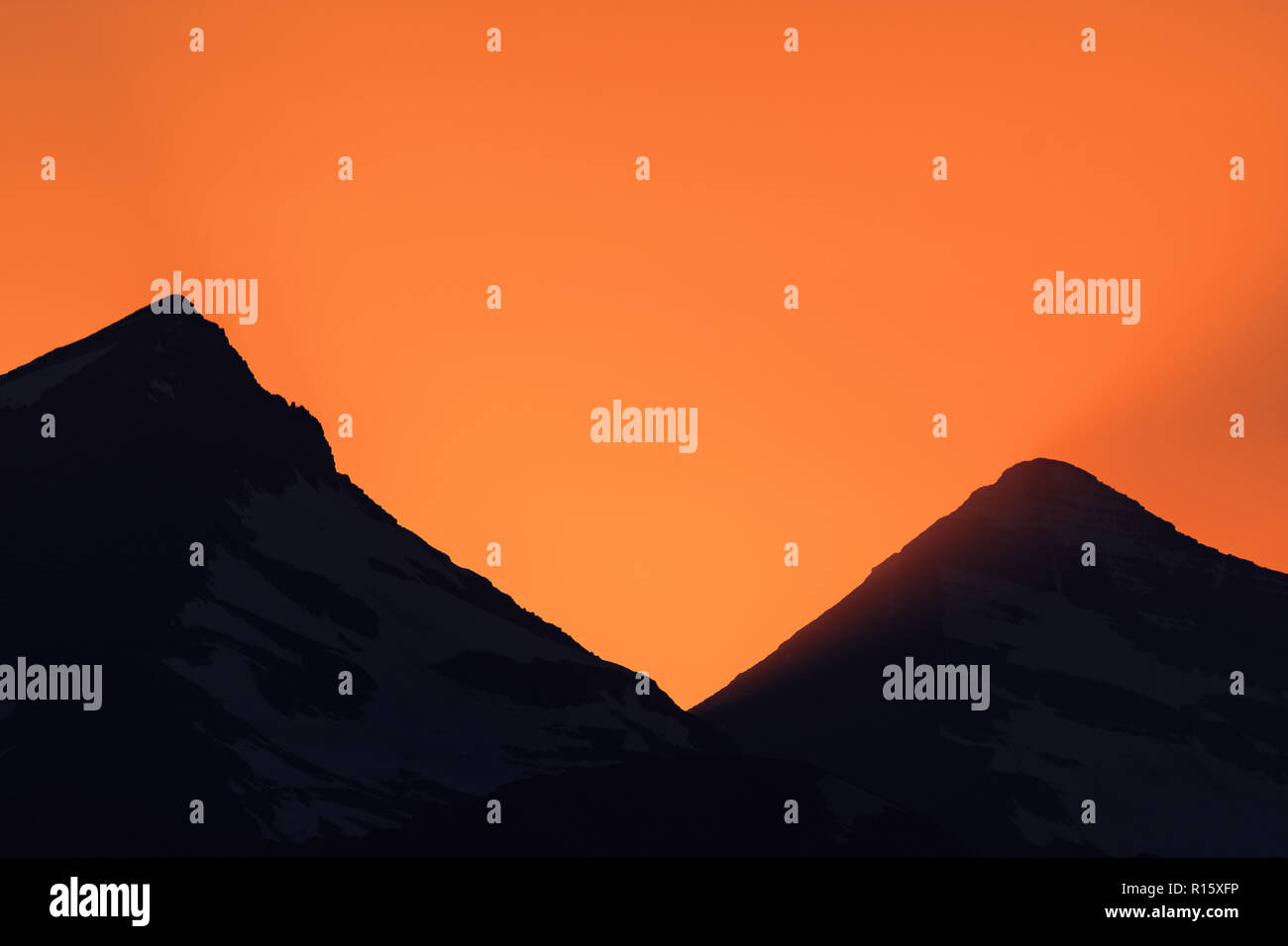 Dramatic sun rays behind Heaven's Peak, Glacier National Park, Montana ...