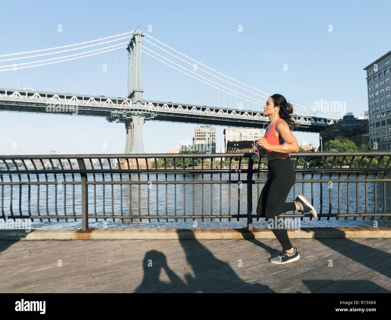 Woman jogs hi-res stock photography and images - Alamy