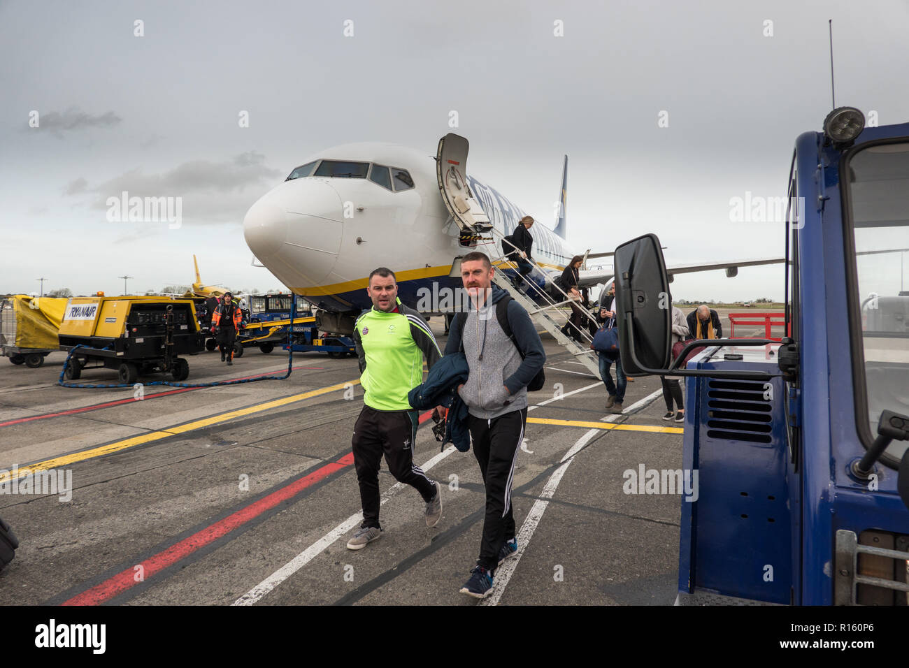 Passengers leaving a Ryanair plane at Dublin Airport Stock Photo - Alamy