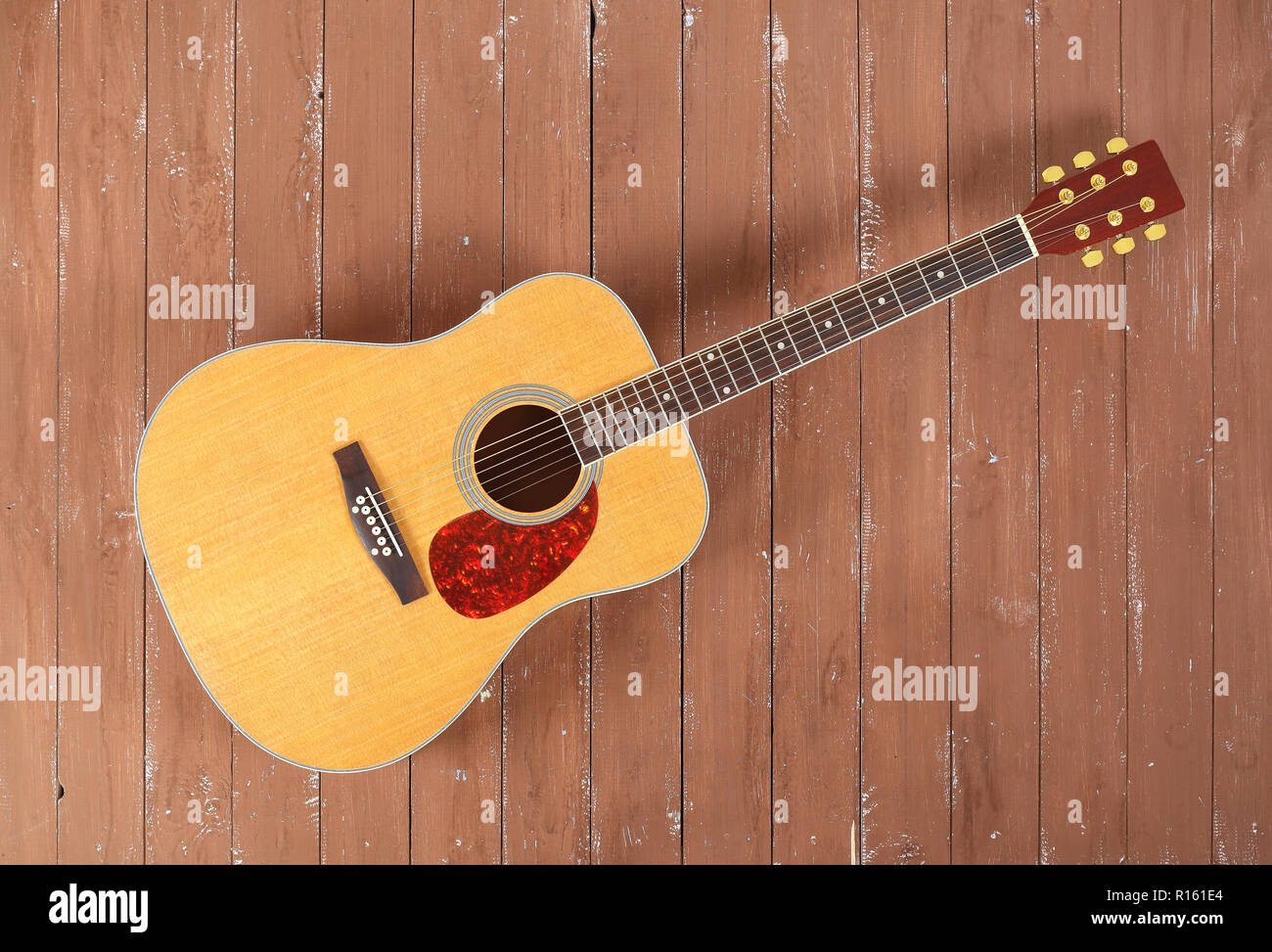 Musical instrument - Top view classic acoustic guitar on a wood ...